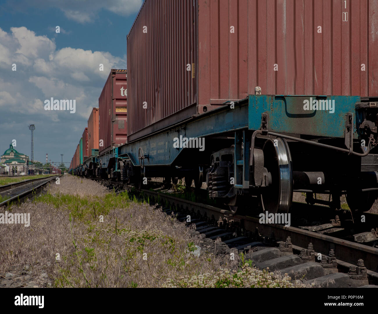 Container loaded on train wagons on a railway Stock Photo - Alamy