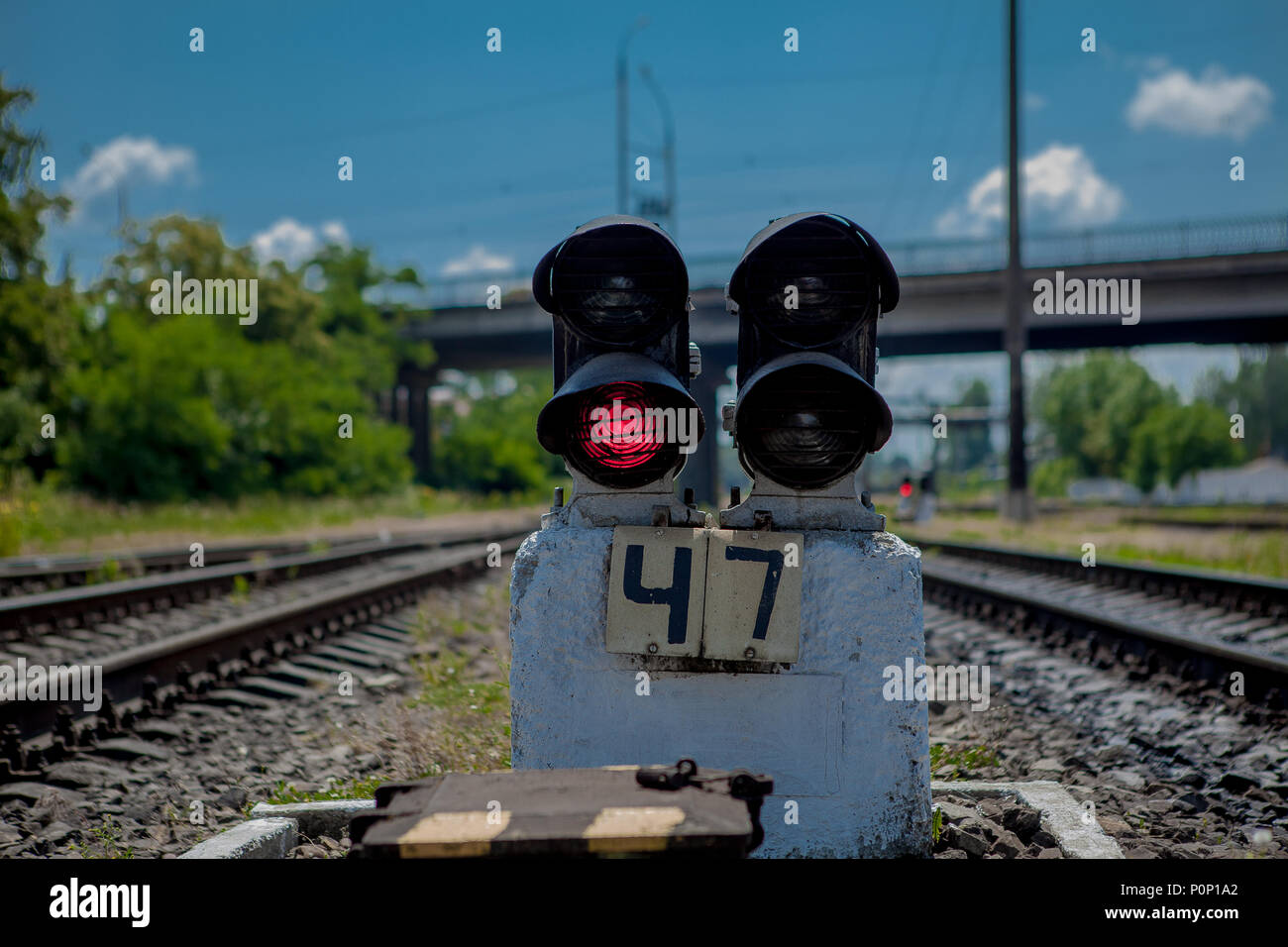 Traffic light shows red signal on railway. Red light. Railway tracks ...