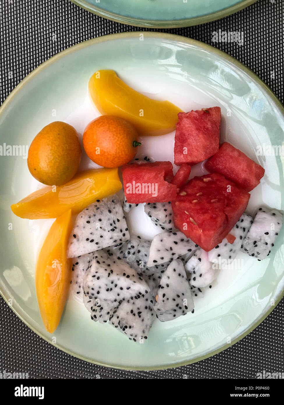 Nanjing, Jiangsu, China. Breakfast Fruit Dish: Kumquats, Watermelon ...