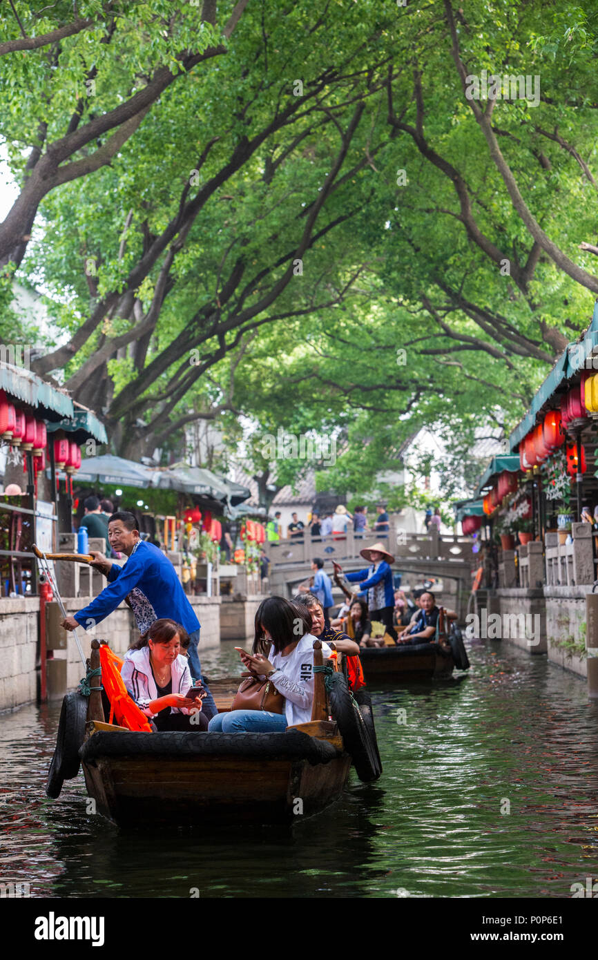 Suzhou, Jiangsu, China. Boats Take Tourists on Canal Rides in Tongli Ancient Town near Suzhou ...