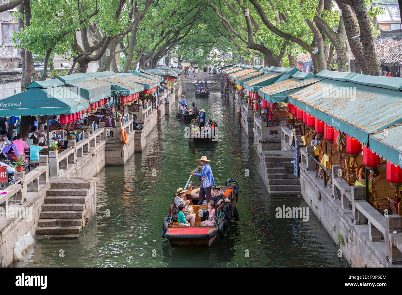 Suzhou, Jiangsu, China. Boats Take Tourists on Canal Rides in Tongli ...