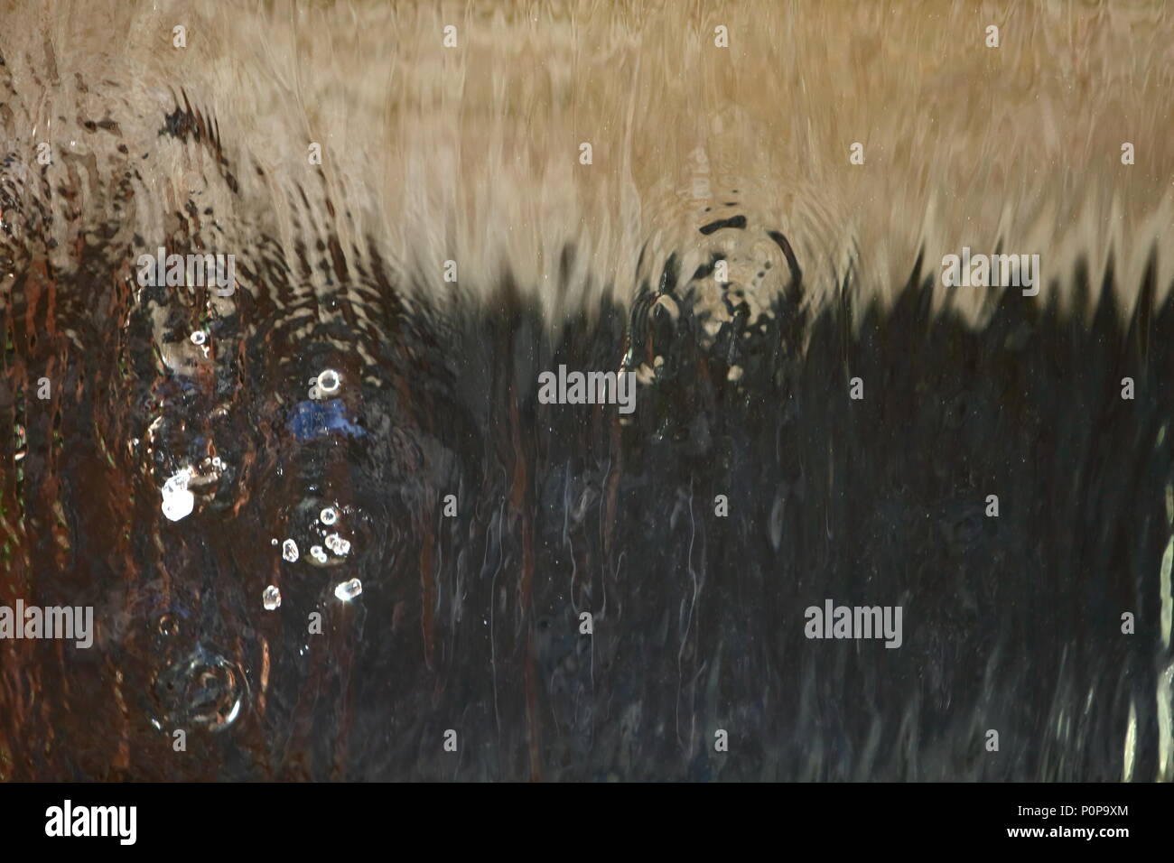 Stopped movement of falling water from the city fountain Stock Photo ...