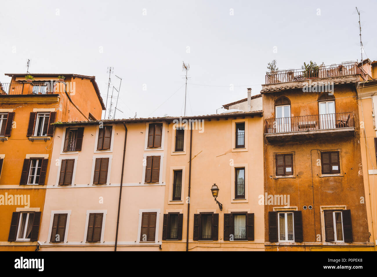 old orange buildings in Rome, Italy Stock Photo - Alamy
