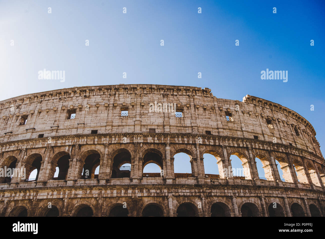 bottom view of antique Colosseum ruins in Rome, Italy Stock Photo - Alamy