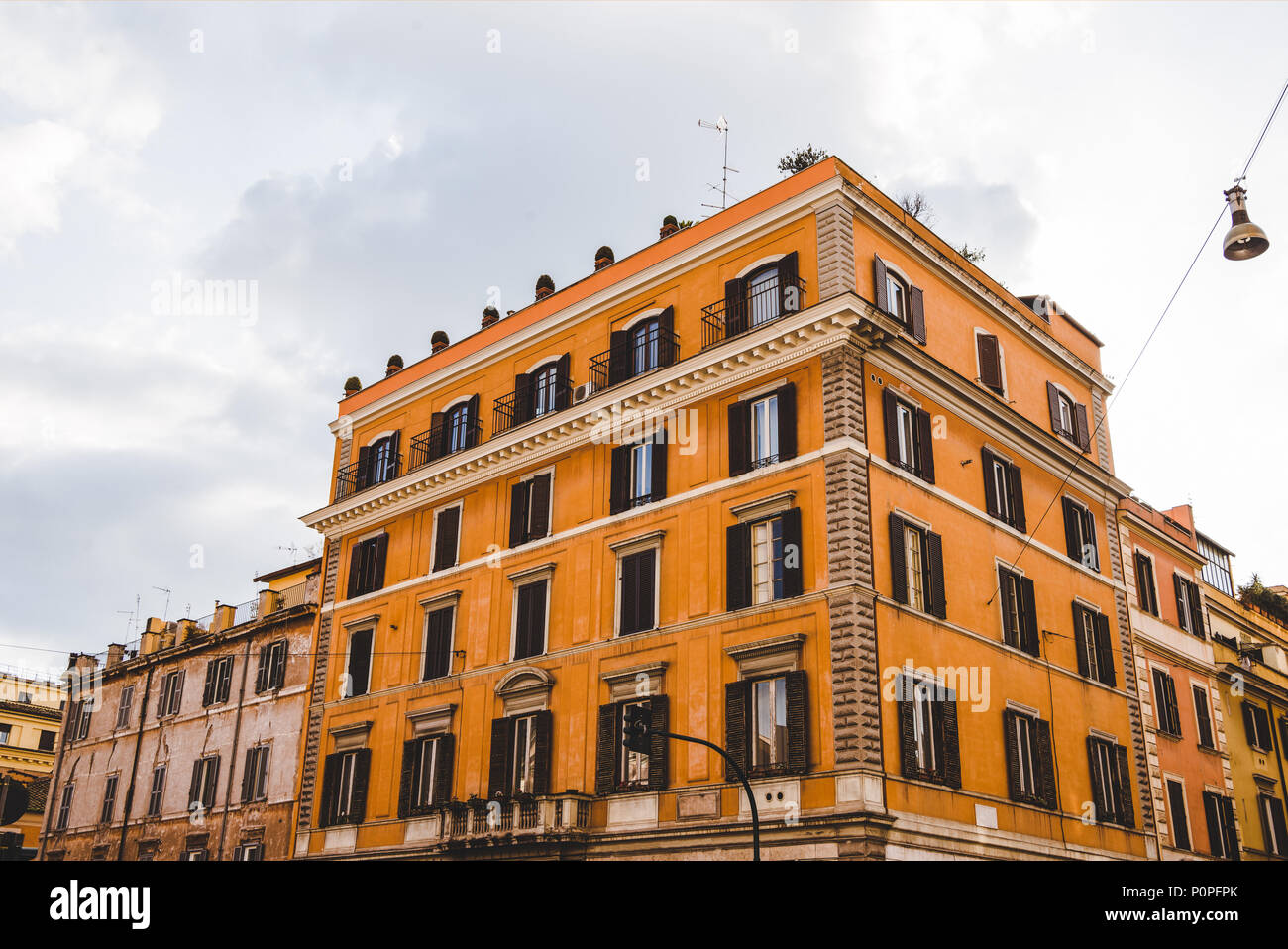 bottom view of orange buildings in Rome, Italy Stock Photo - Alamy