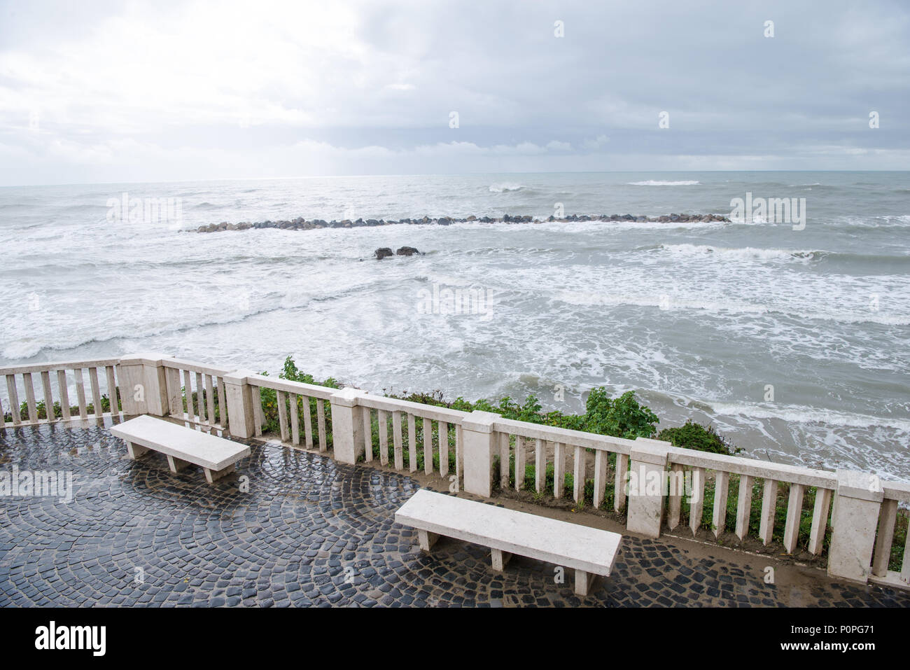 view of stormy mediterranean sea from ancient terrace, Anzio, Italy ...