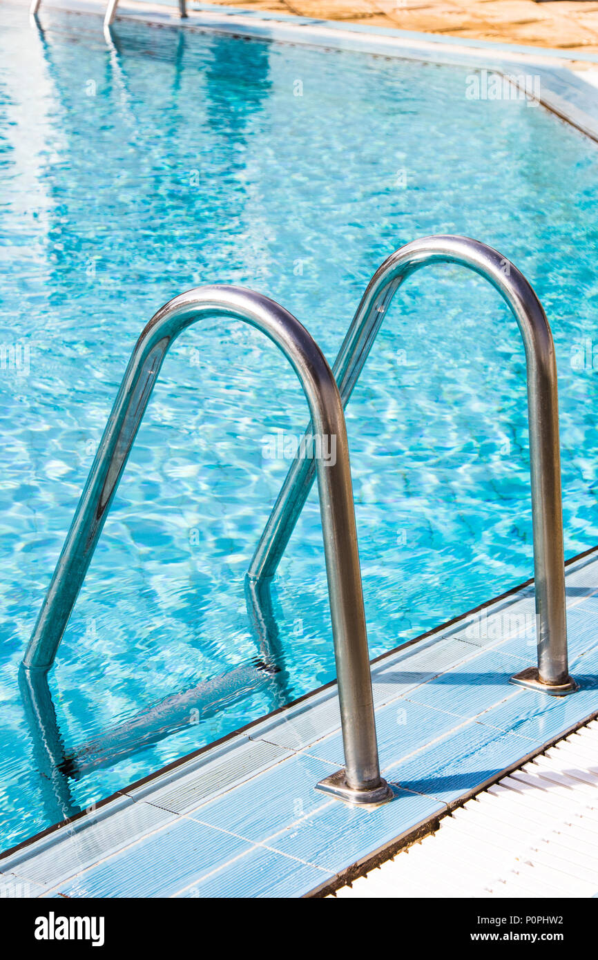 Clear transparent pool water and railings Stock Photo - Alamy