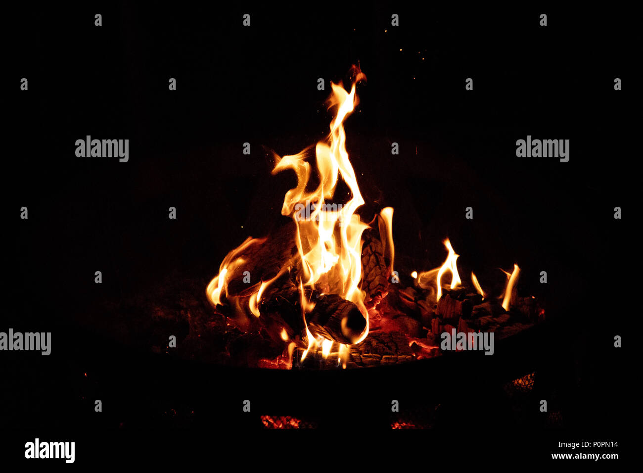 fun night around the fire Stock Photo - Alamy