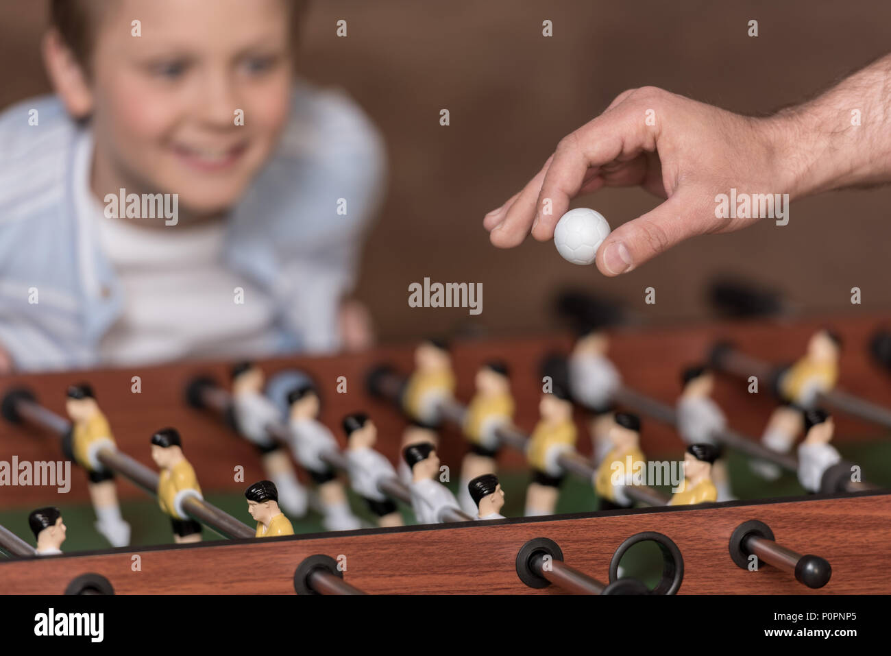 Hand and foosball table hi-res stock photography and images - Alamy