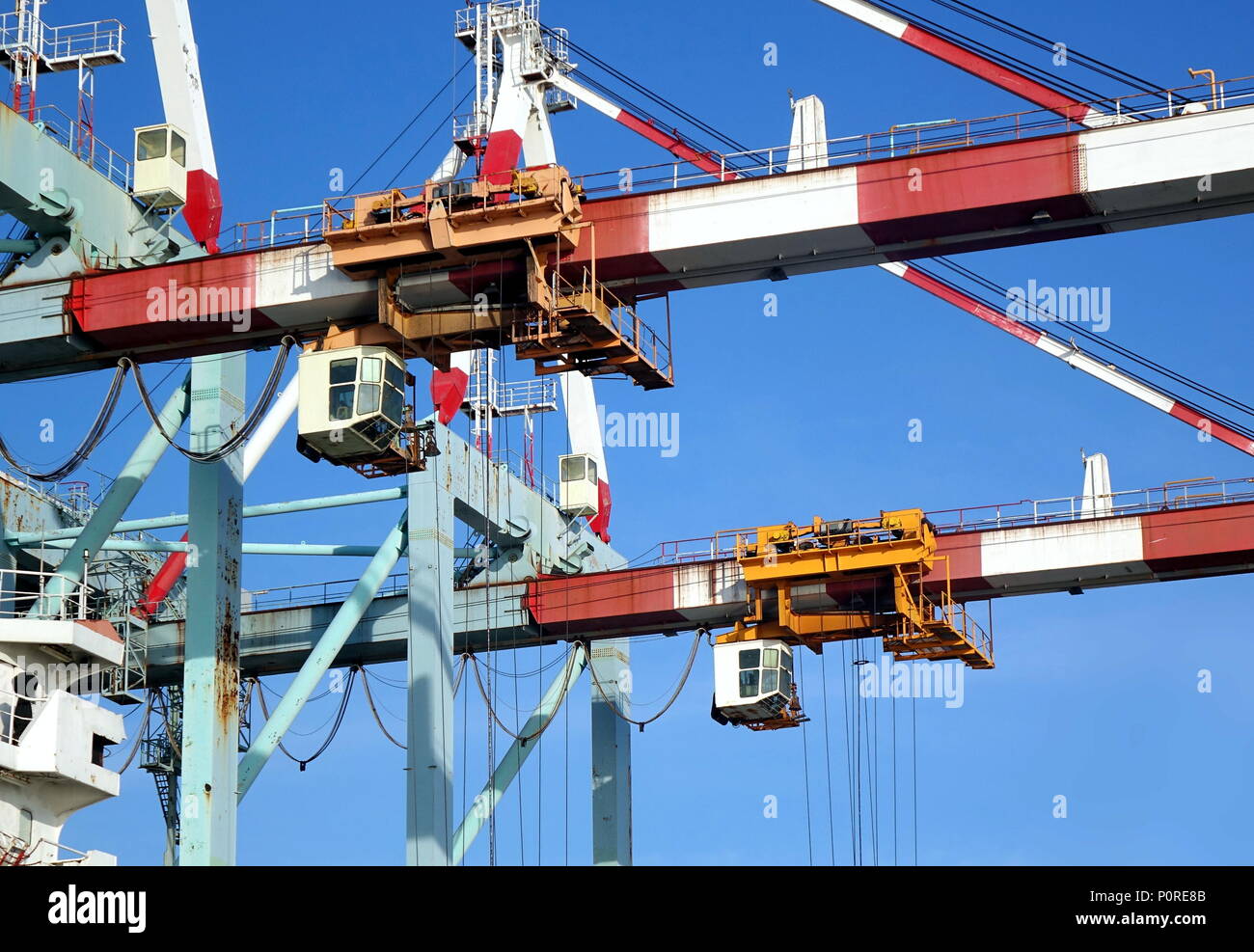 Large cranes used for loading containers on to ships Stock Photo - Alamy