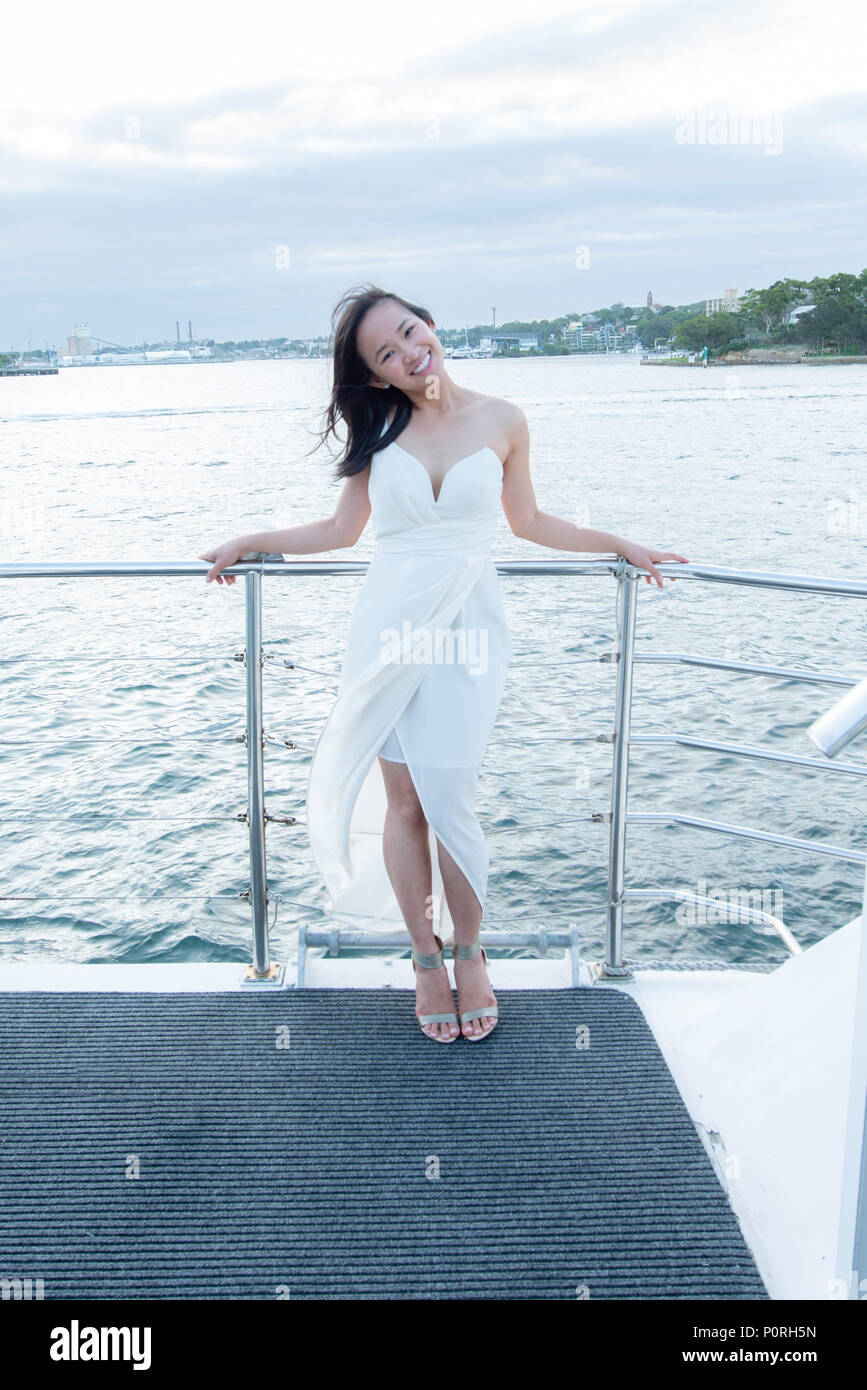 Pretty girl on a sailboat hi-res stock photography and images - Alamy
