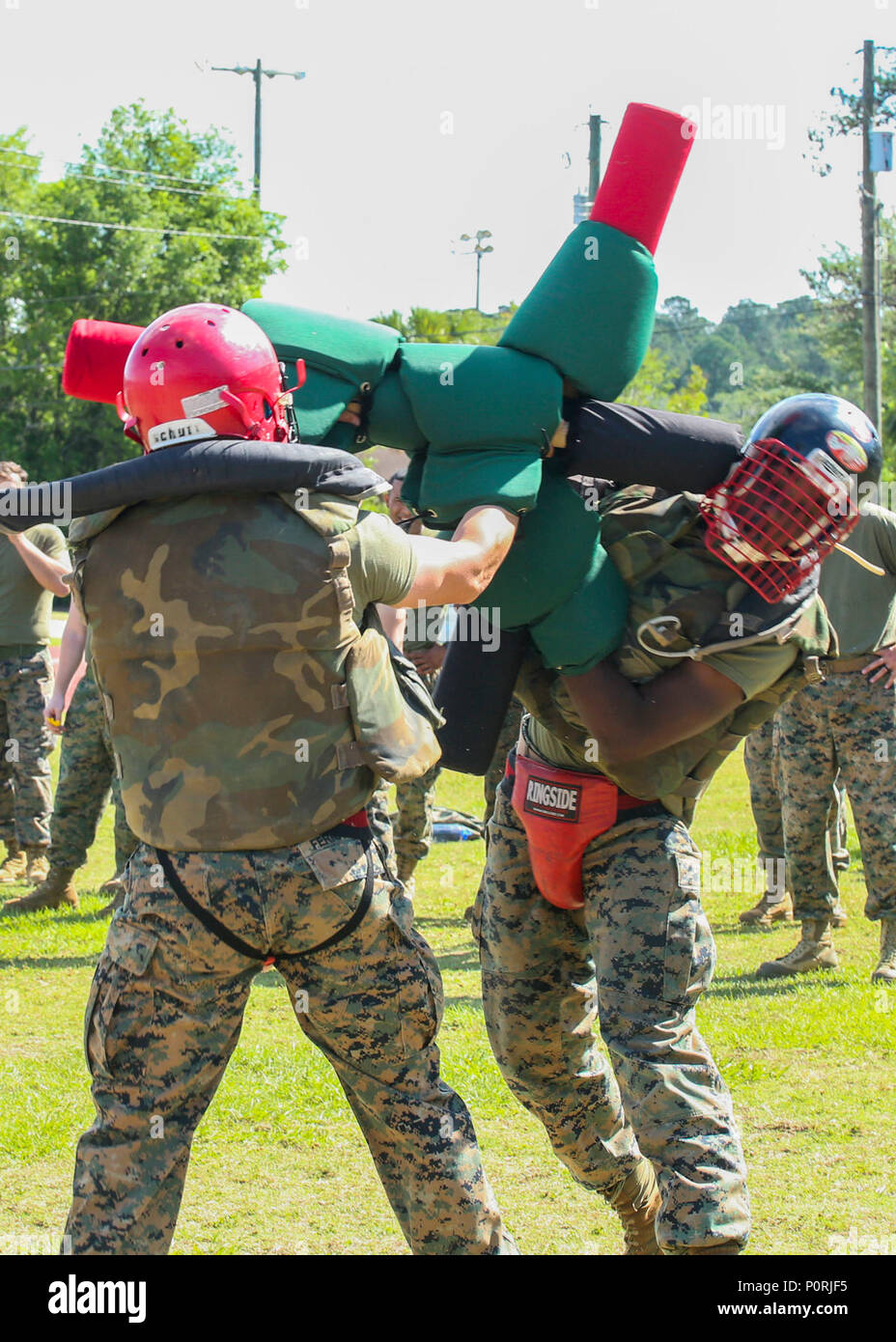 Marines compete during a pugil stick bout aboard Marine Corps Air ...