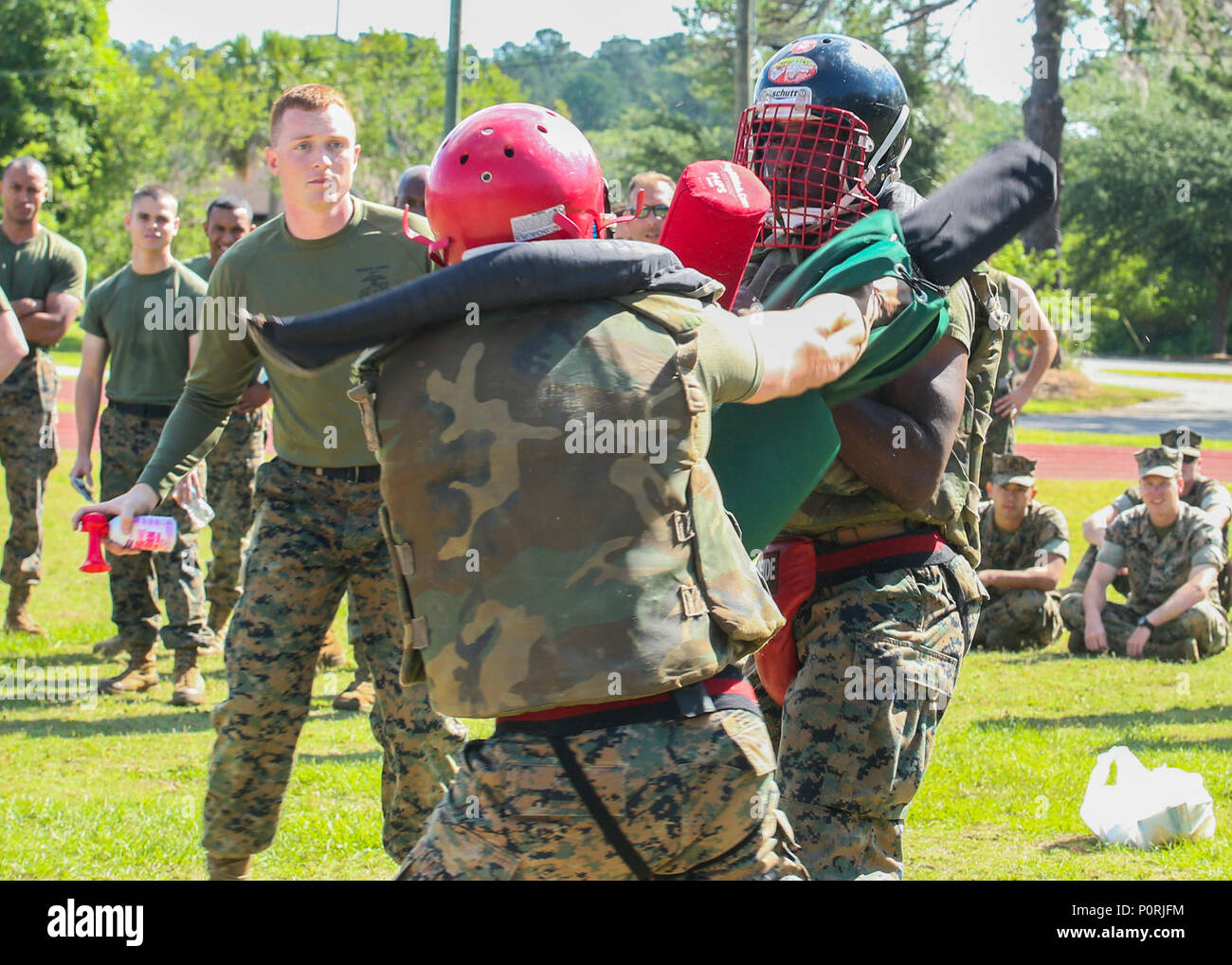 Marines compete in a pugil stick bout aboard Marine Corps Air Station Beaufort, May 5 ...