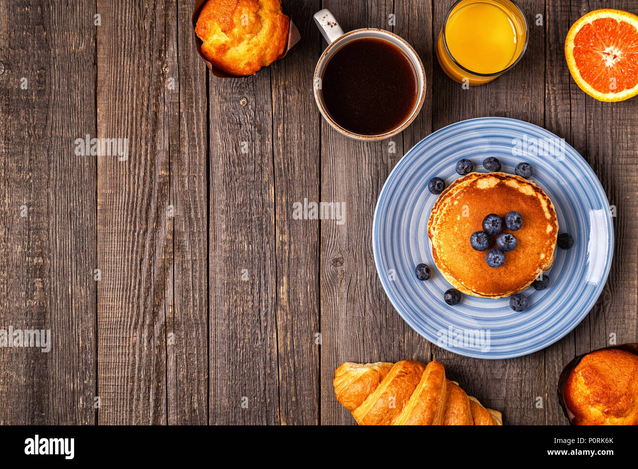 Delicious breakfast on a rustic table. Top view, copy space Stock Photo ...