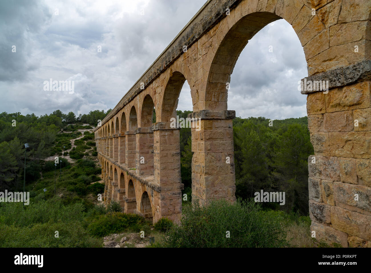The beautiful and historic remains of the Roman Aqueduct named Pont del ...