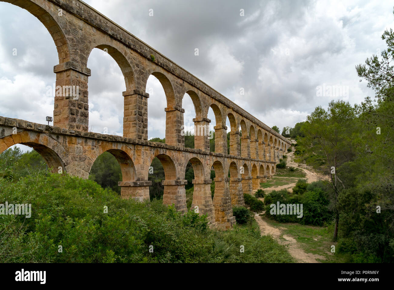 The beautiful and historic remains of the Roman Aqueduct named Pont del ...