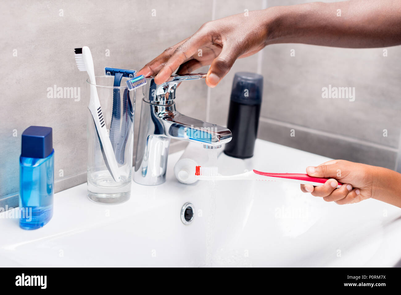 Father son washing hands hi-res stock photography and images - Alamy
