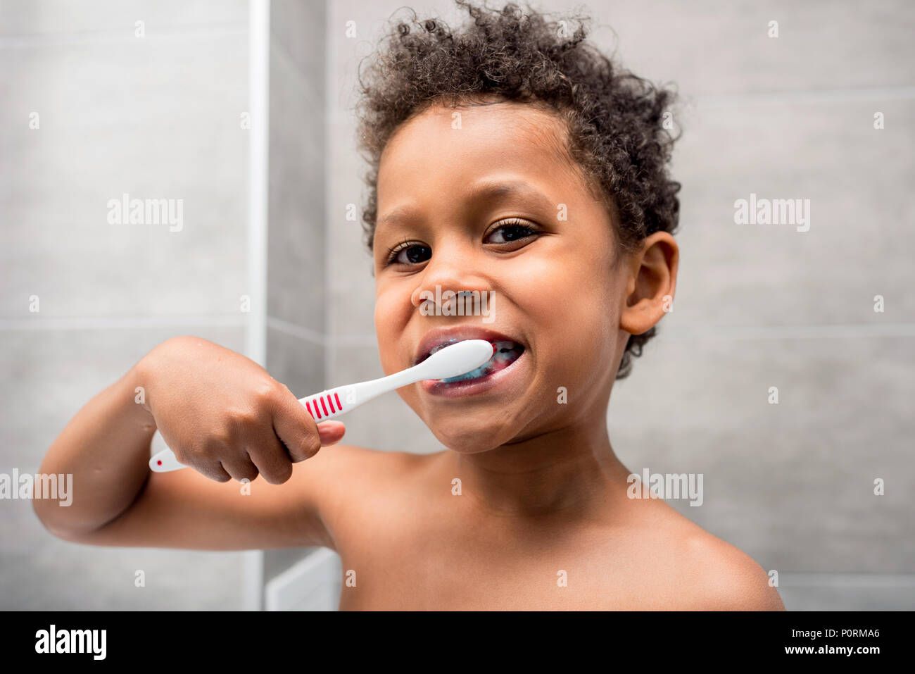 African american boy brushing teeth hi-res stock photography and images ...
