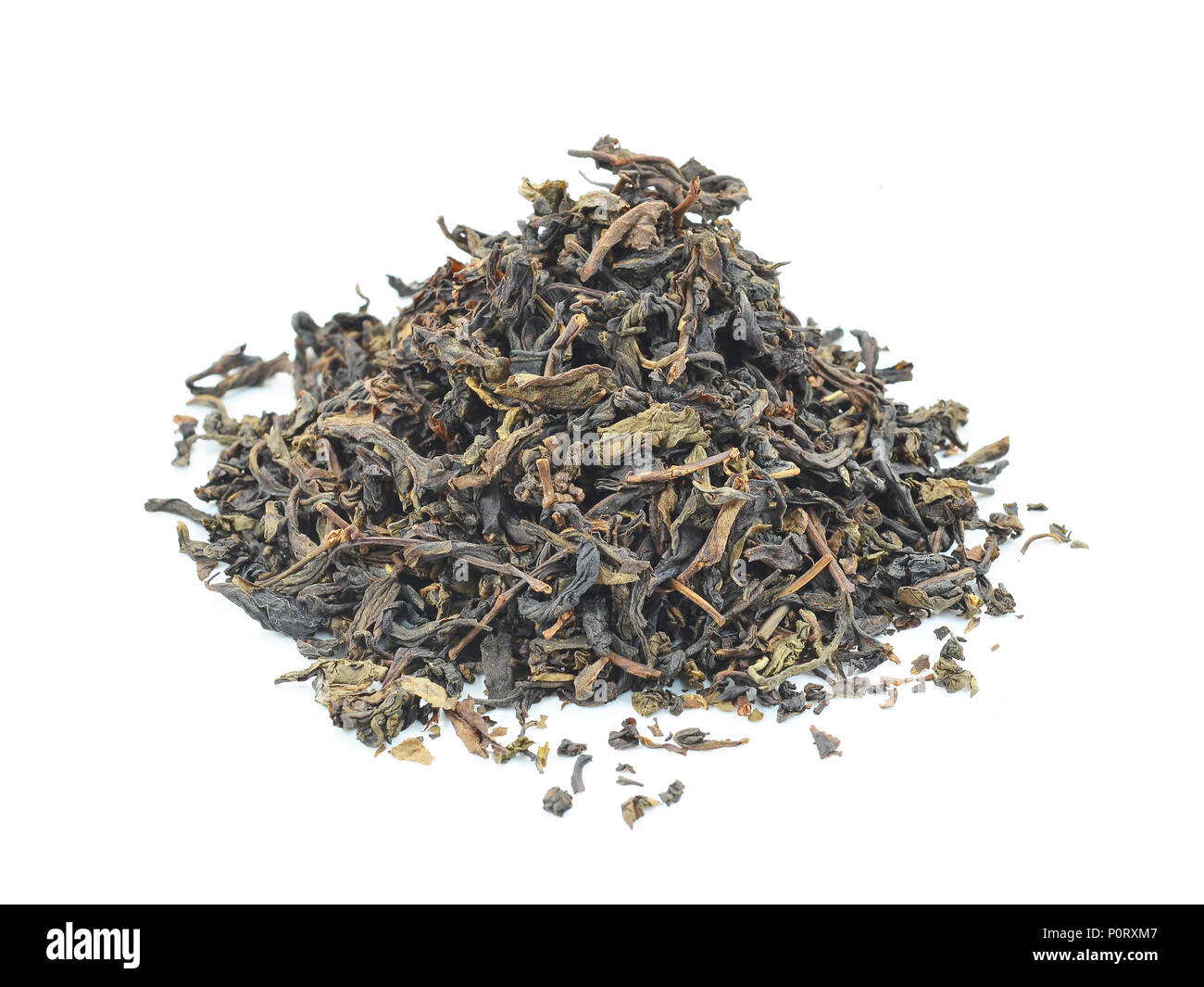 dry black tea leaves isolated on white Stock Photo - Alamy