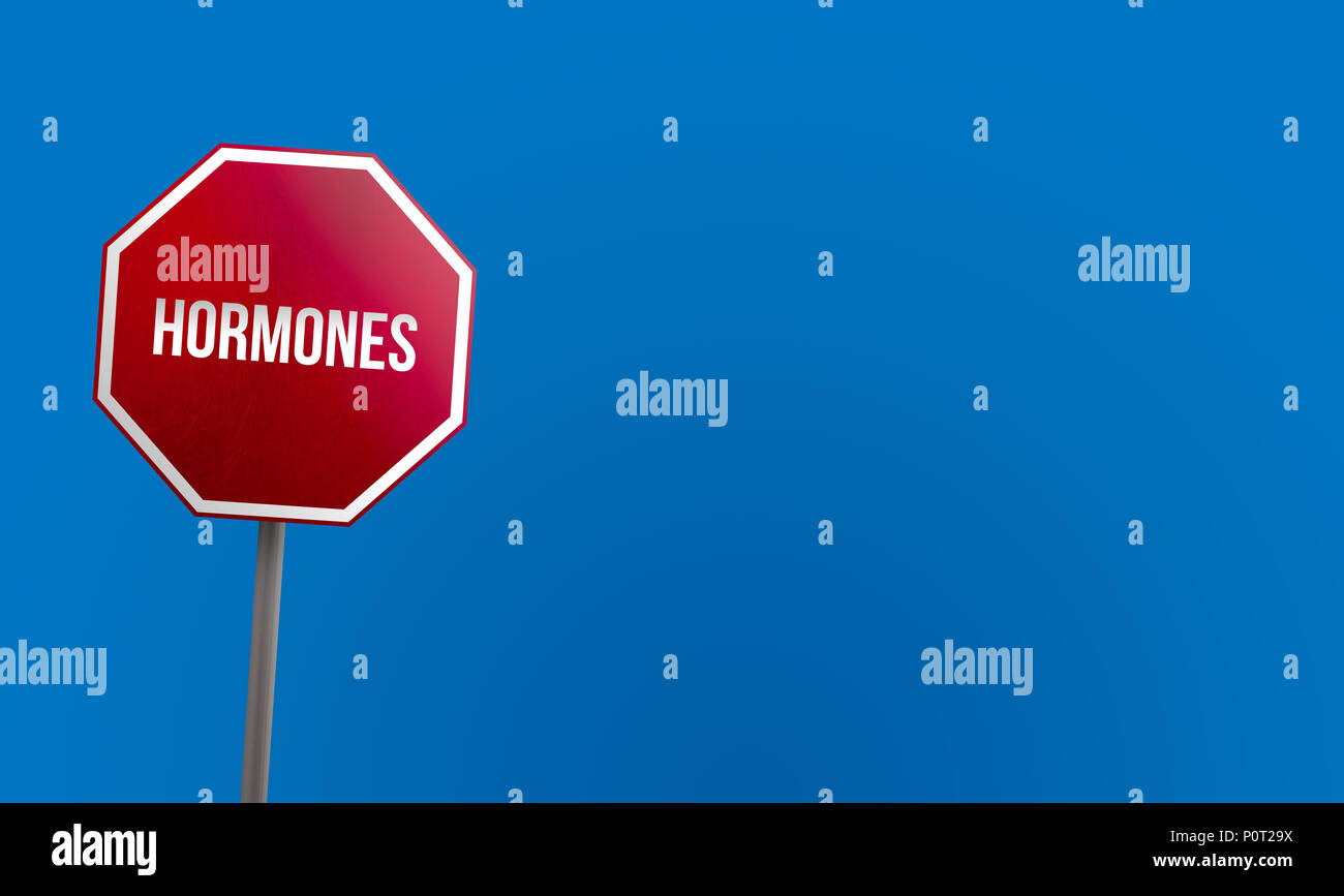 hormones - red sign with blue sky Stock Photo - Alamy