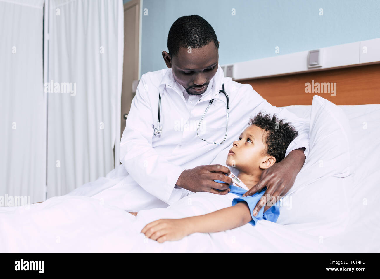 Sick african child temperature hospital hi-res stock photography and ...