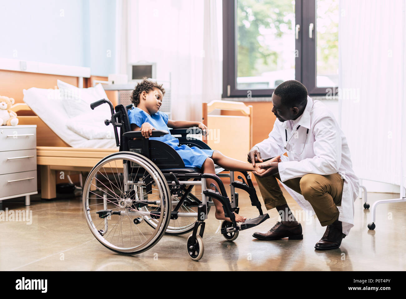 Doctor examining foot hi-res stock photography and images - Alamy