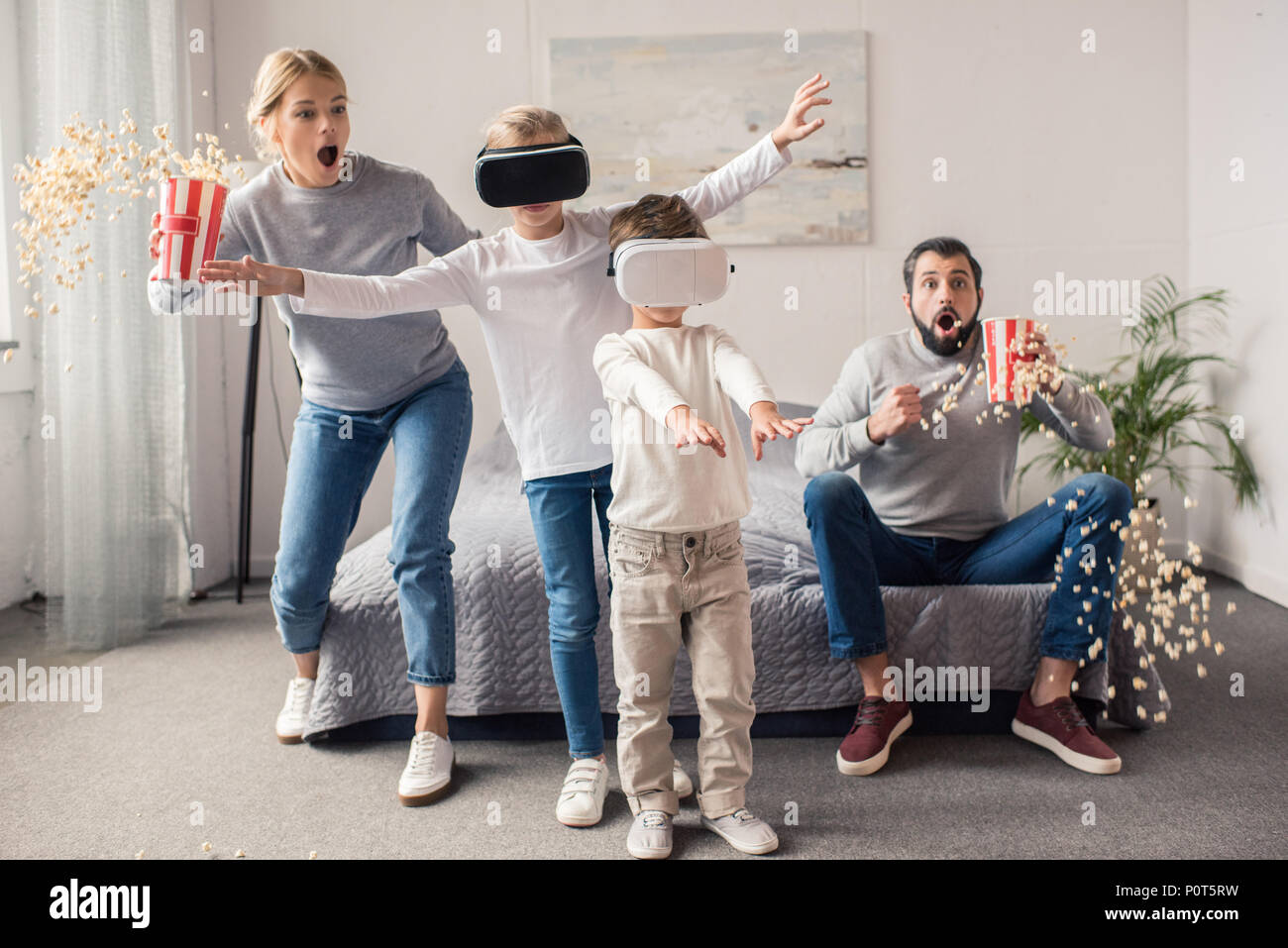 Parents watching kids playing hi-res stock photography and images - Alamy