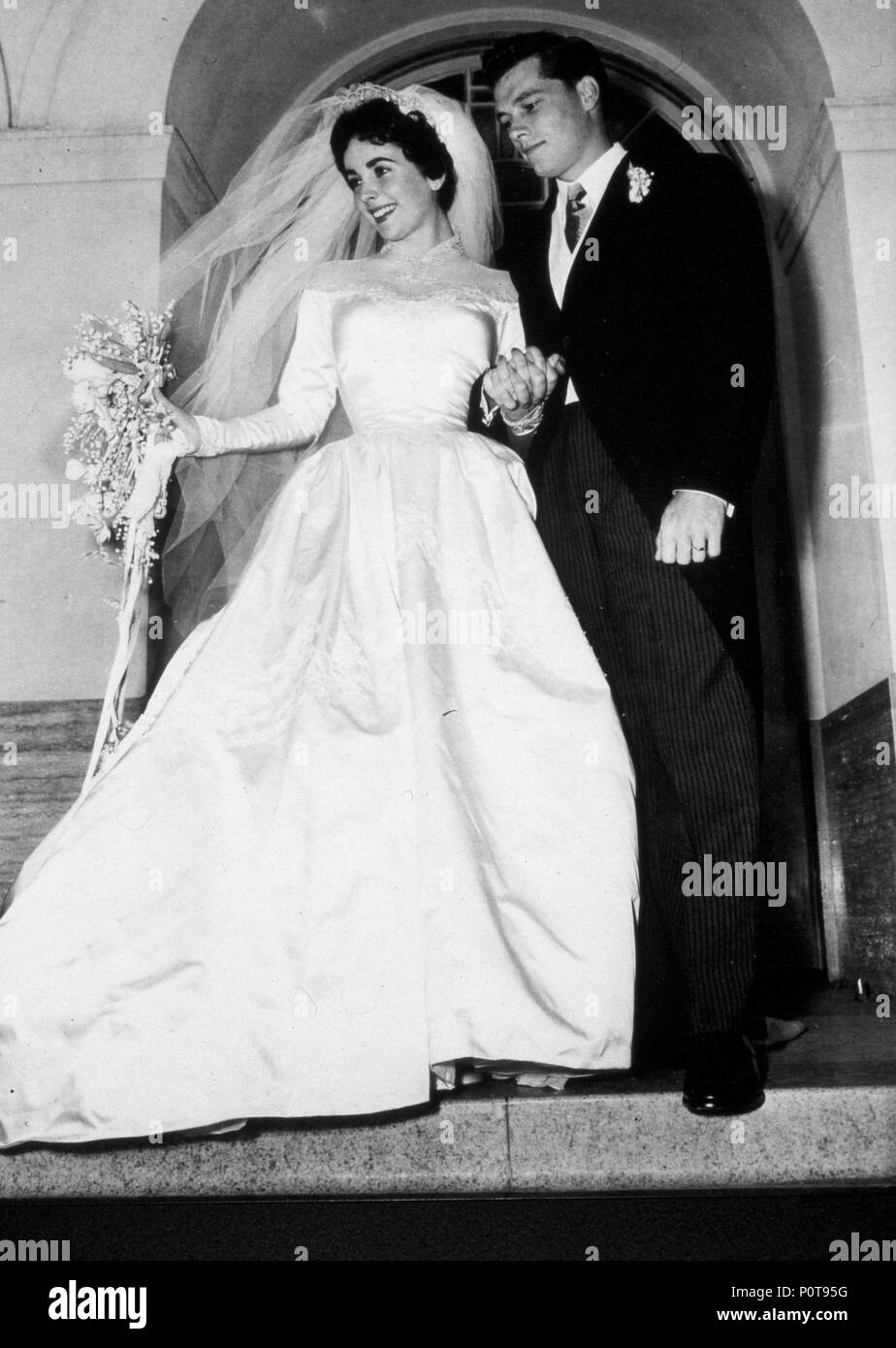 Stars: ELIZABETH TAYLOR; NICHOLAS CONRAD "NICKY" JR. HILTON Stock Photo ...