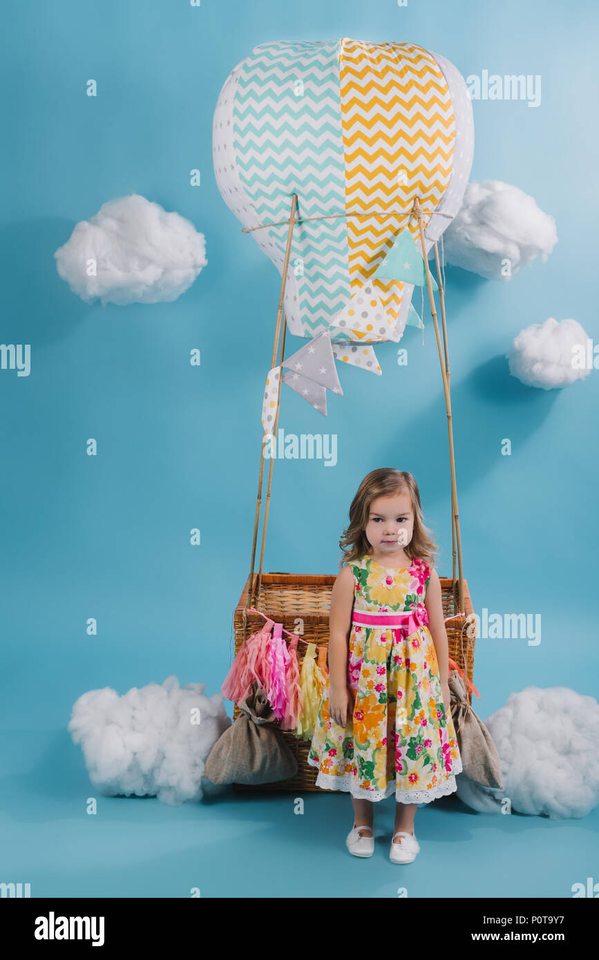 adorable little child pretending to fly hot air balloon Stock Photo - Alamy