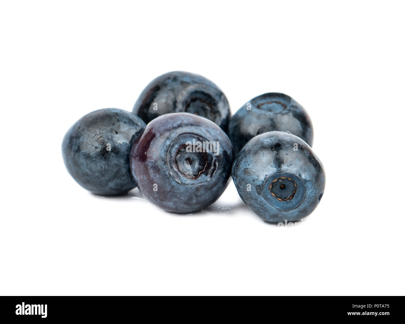 Five fresh and ripe blueberries on a white background Stock Photo - Alamy