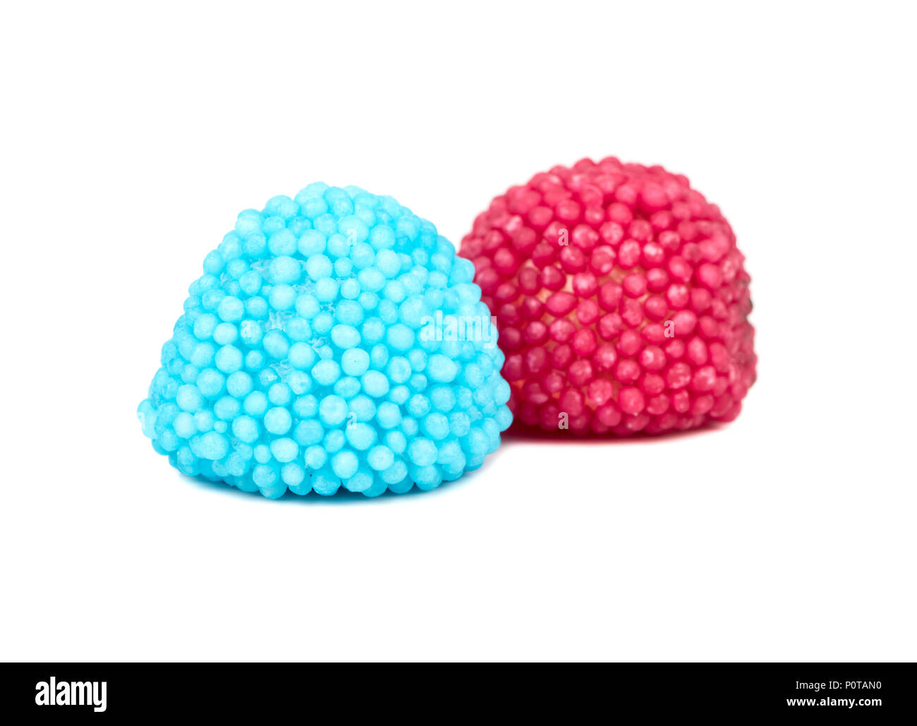 Red and blue berry jelly candy on a white background Stock Photo - Alamy