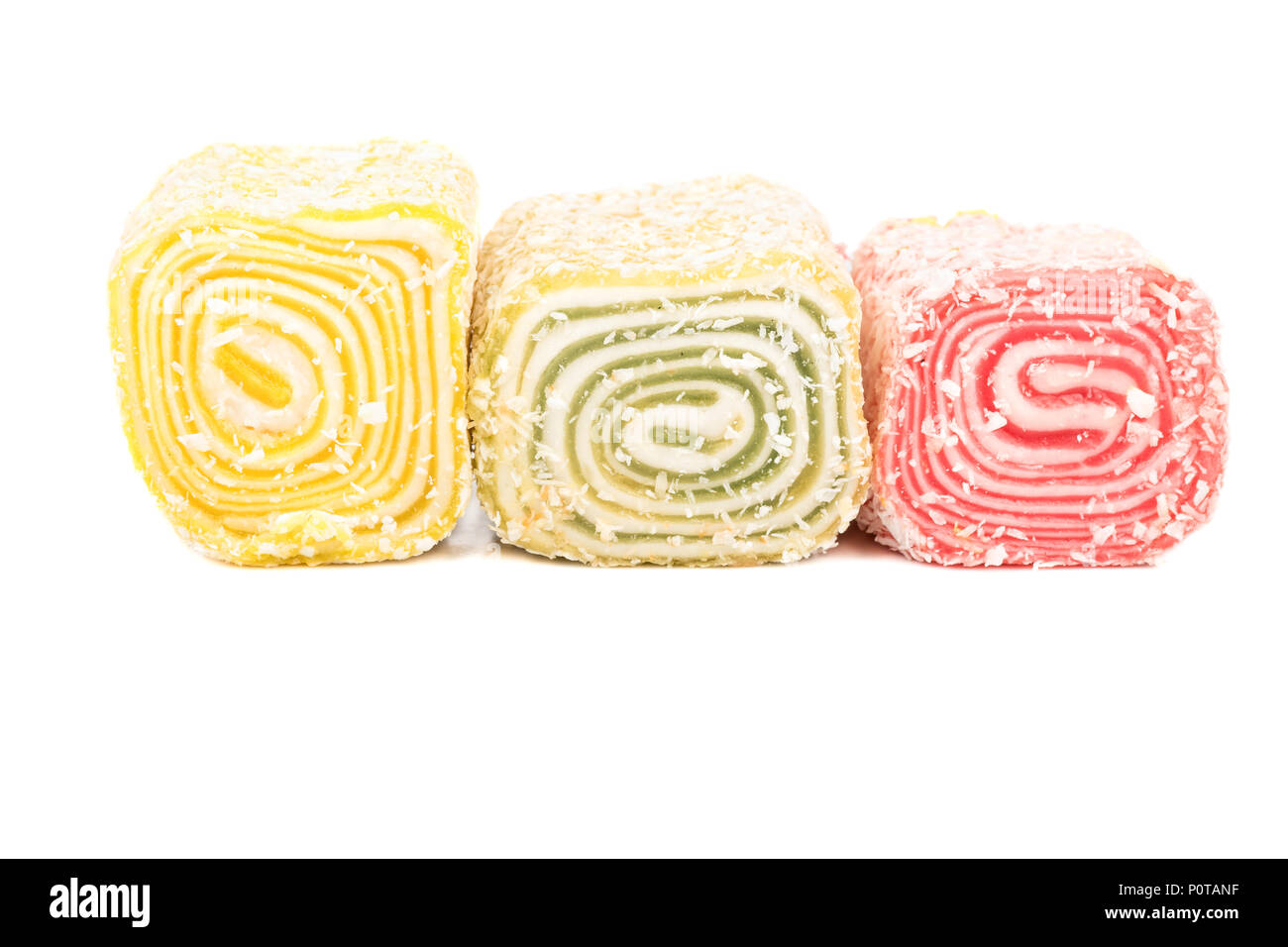 Three colored turkish delight on white background Stock Photo - Alamy