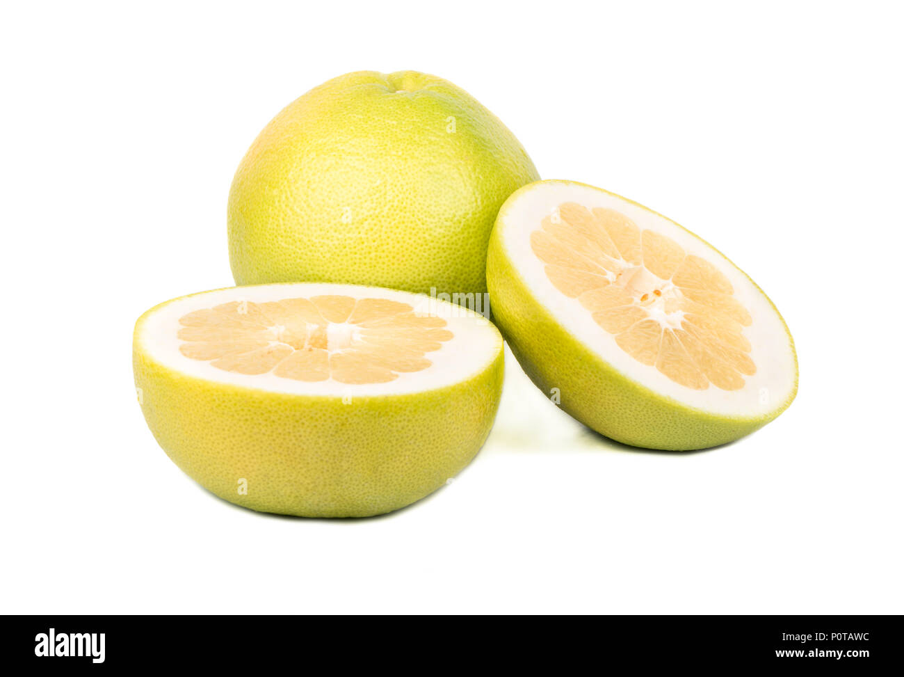 Fresh fruit Oroblanco two halves on a white background Stock Photo - Alamy
