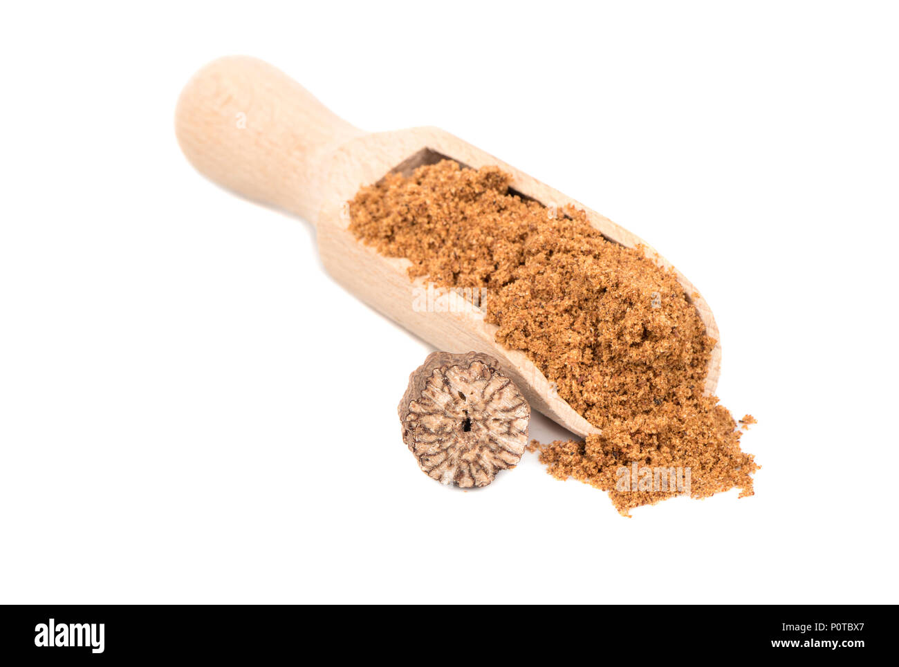 Nutmeg powder in spoon Cut Out Stock Images & Pictures - Alamy