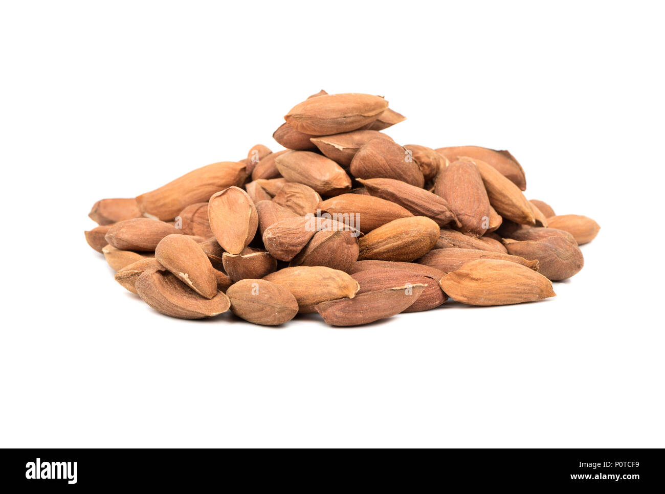 Pile of dry uzbek almond without shell on white background Stock Photo ...
