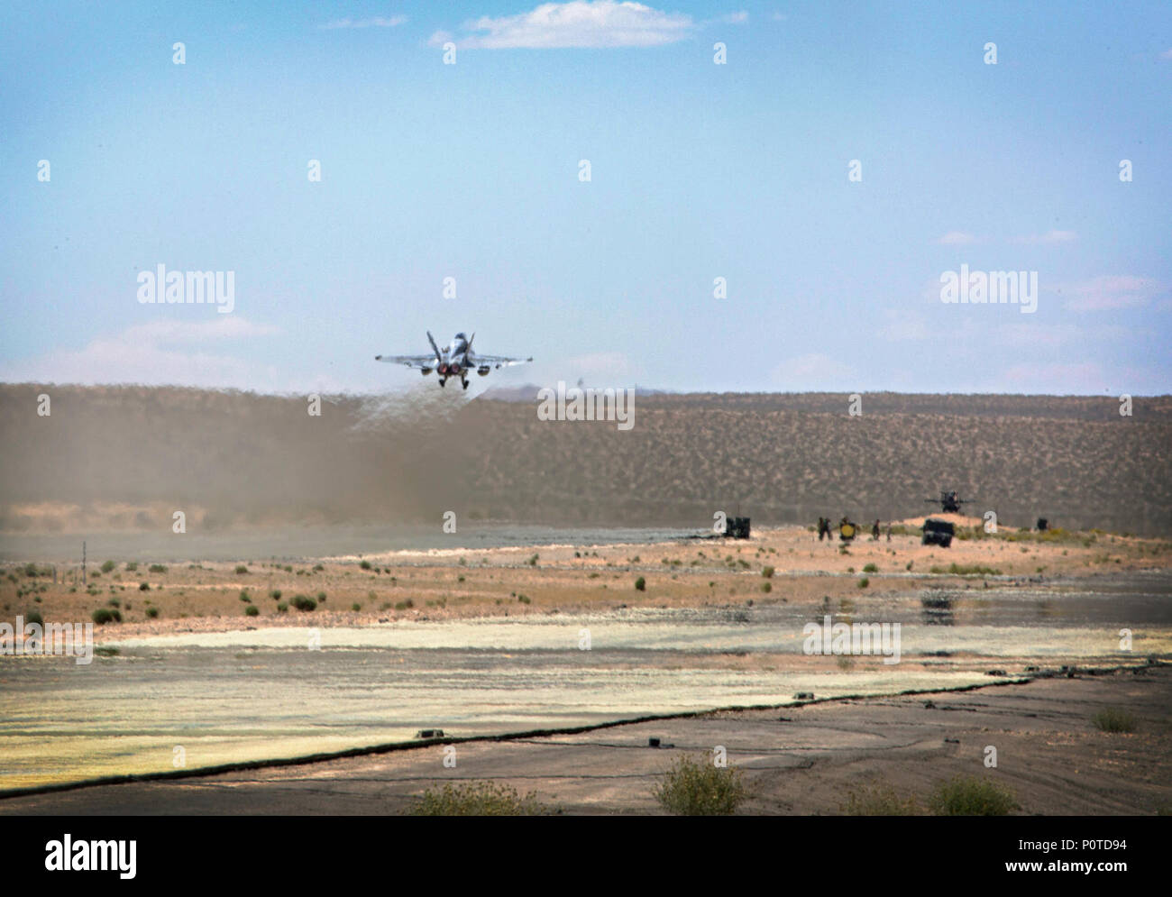 An F/A-18C Hornet, with Marine Fighter Attack Squadron (VMFA) 314 ...
