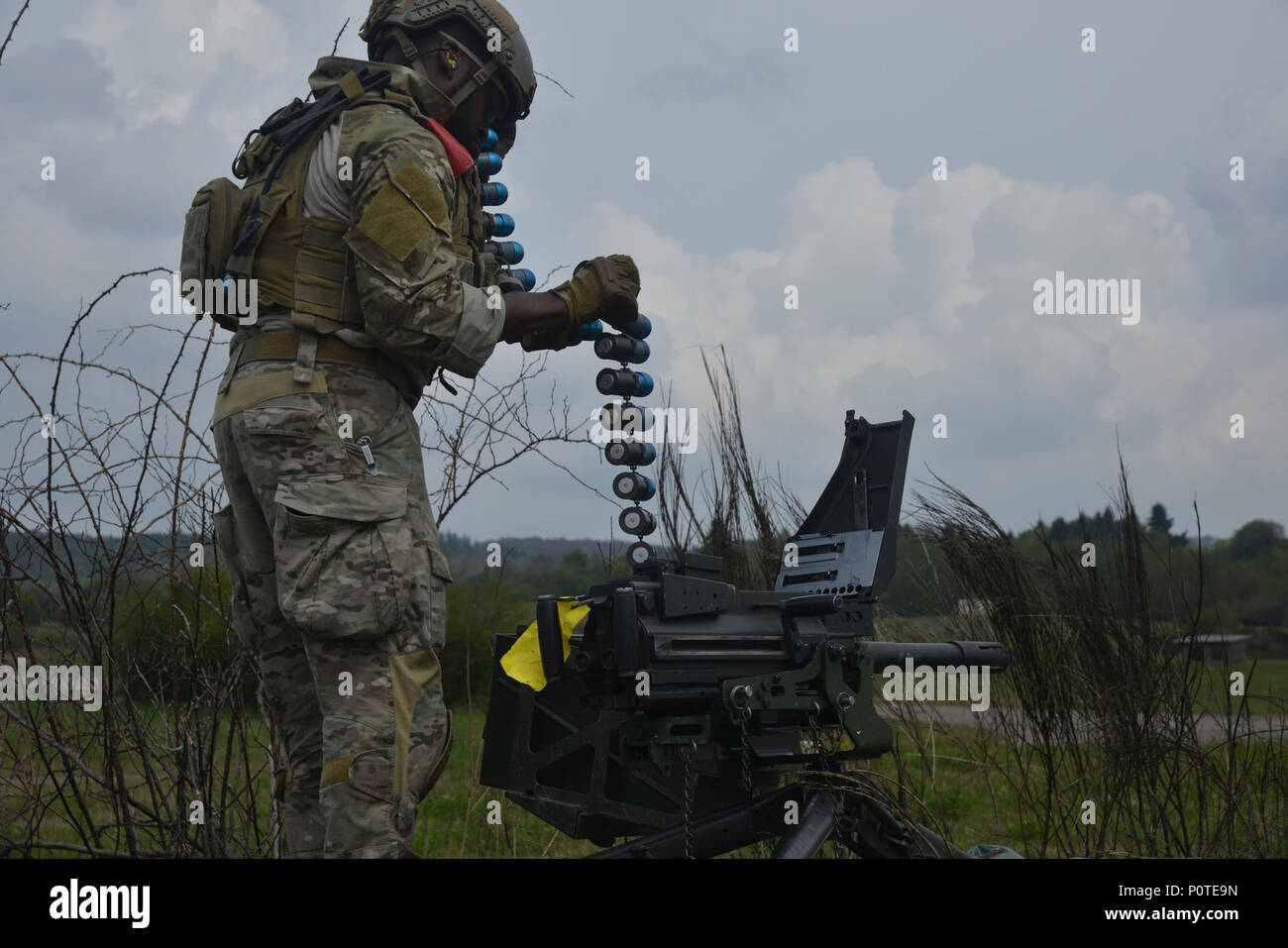 U.S. Soldiers assigned to 1-10th Special Forces Group firing .50 cal ...