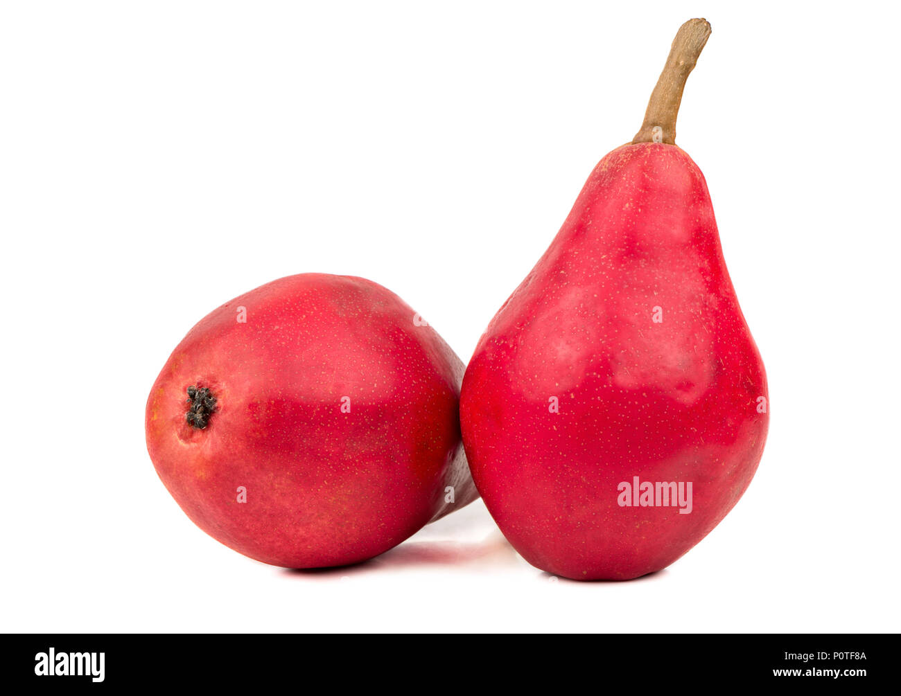 Two ripe red fruit pears on white background Stock Photo - Alamy