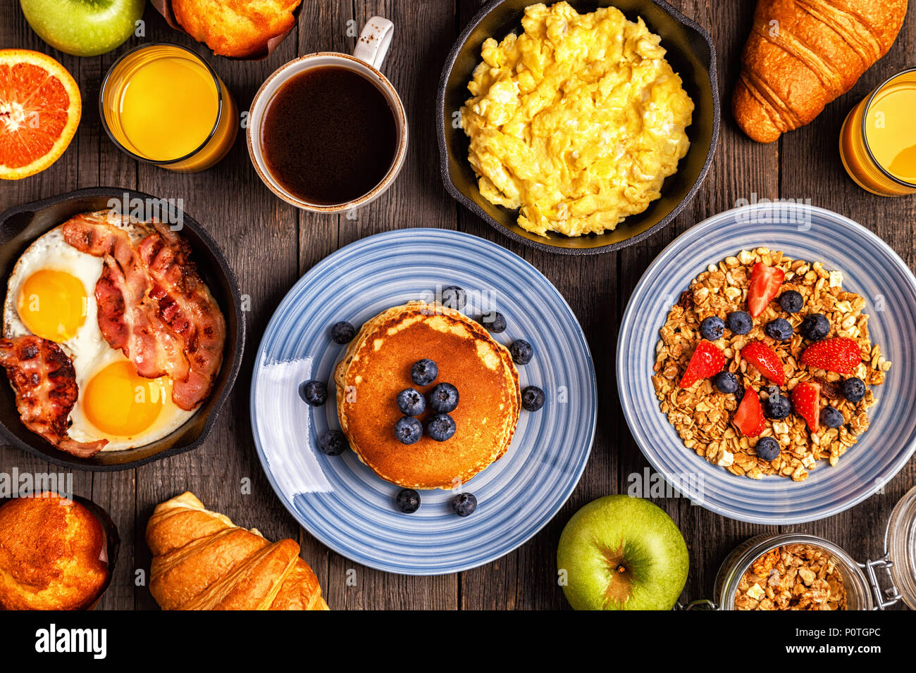Delicious breakfast on a rustic table. Top view, copy space Stock Photo ...