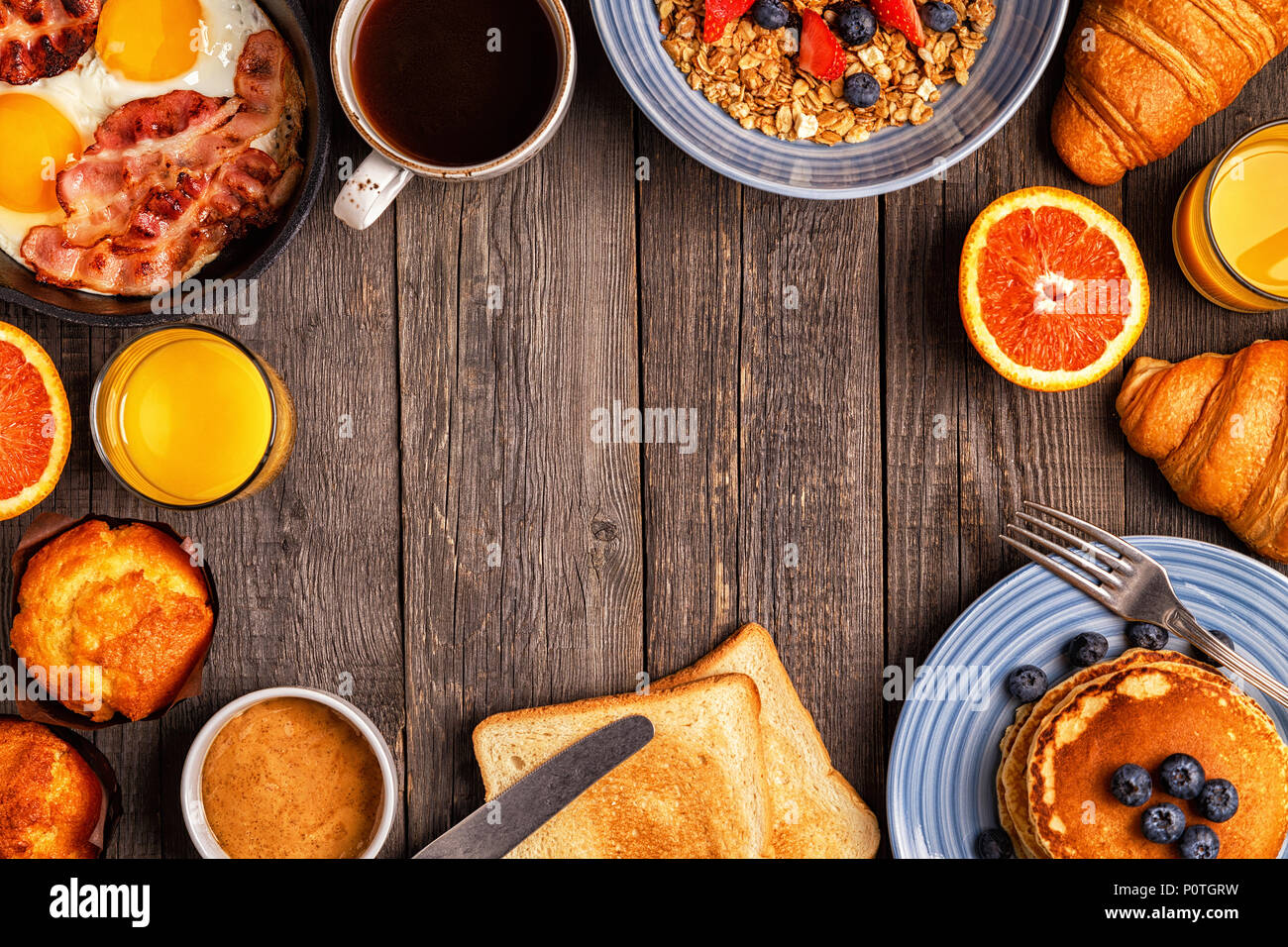 Delicious breakfast on a rustic table. Top view, copy space Stock Photo ...