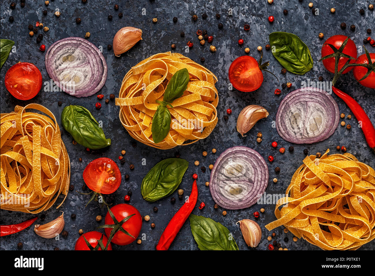 Italian food background with pasta, spices and vegetables. Top view ...
