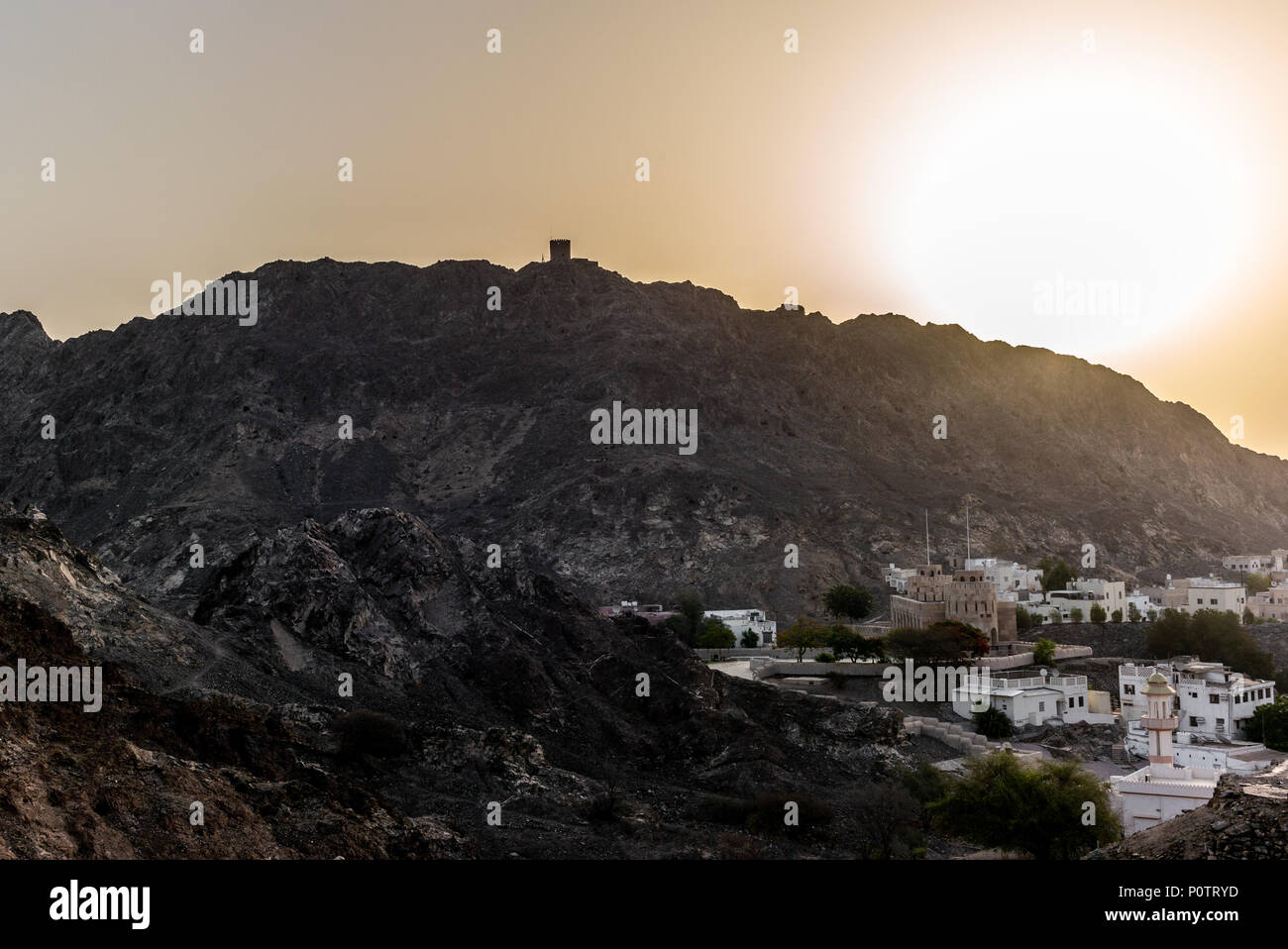 Sunrise in summer on the old town of Muscat in Oman - 3 Stock Photo - Alamy