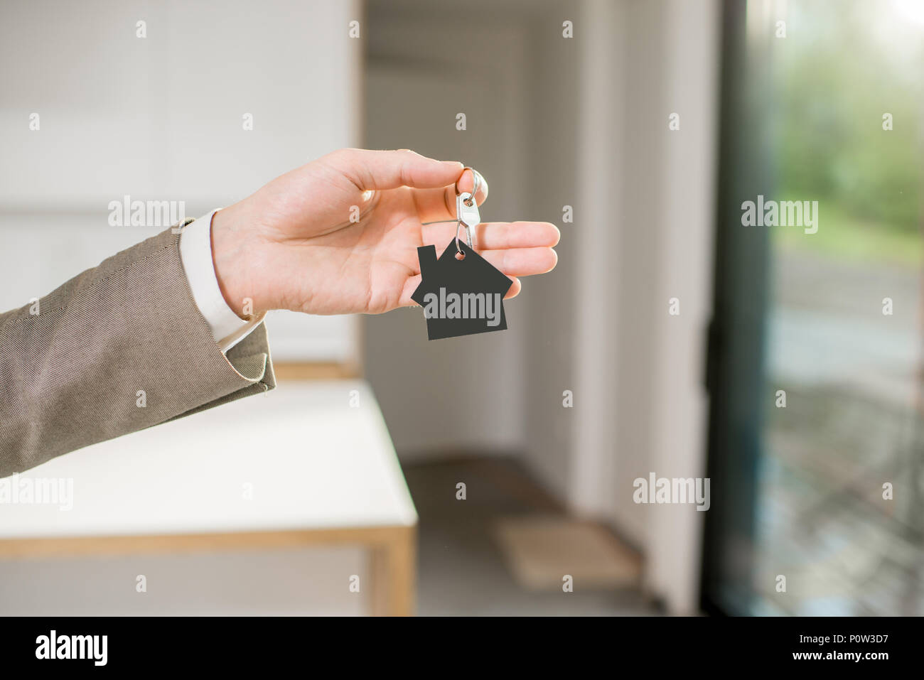 Handing keys hi-res stock photography and images - Alamy