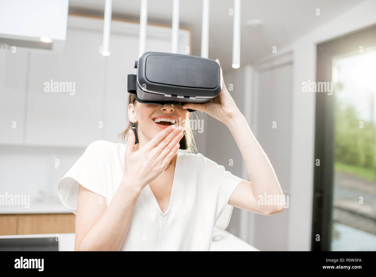 Woman watching vr glasses hi-res stock photography and images - Alamy