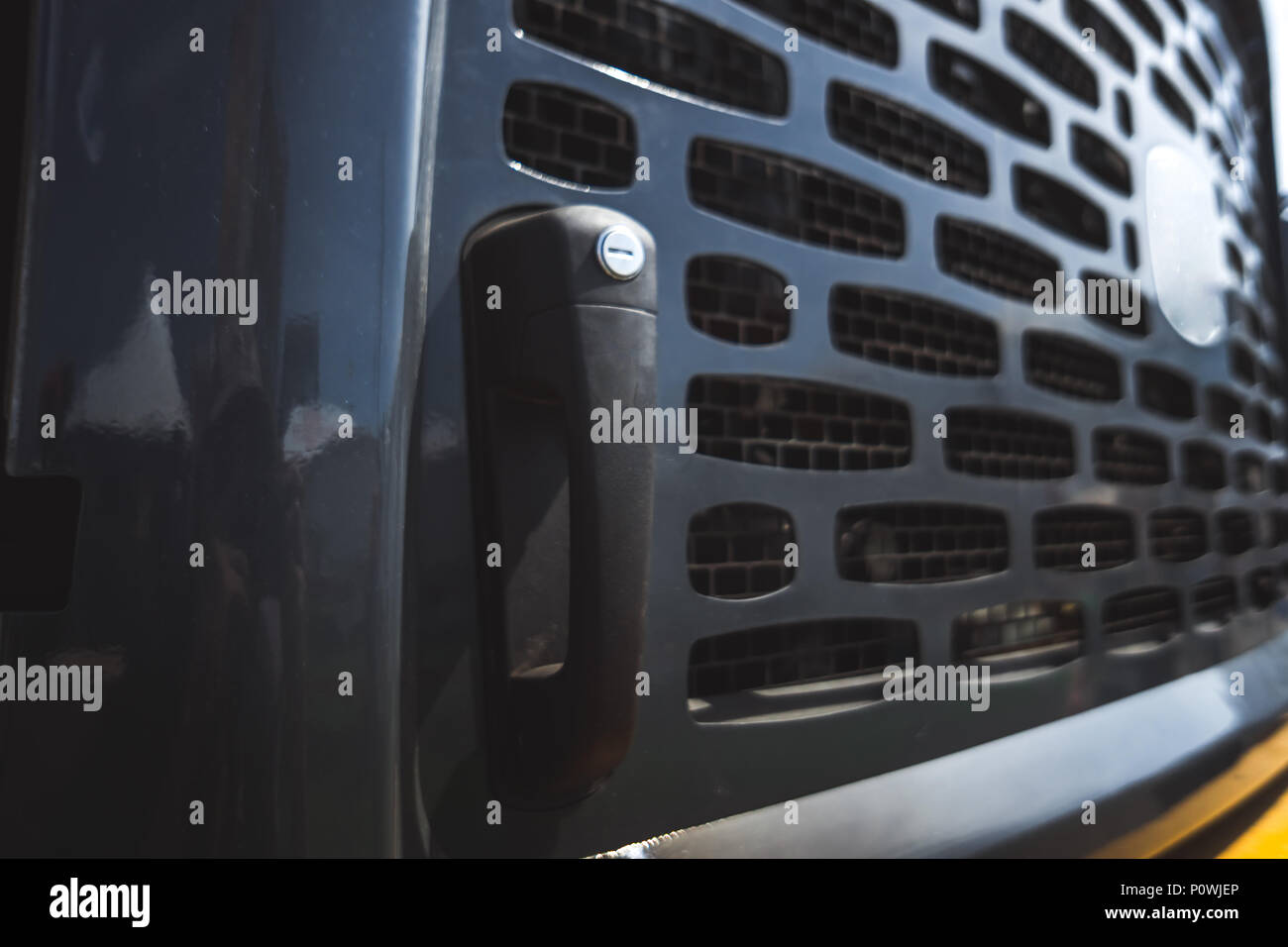 yellow front Grille of the new farm tractor Stock Photo - Alamy