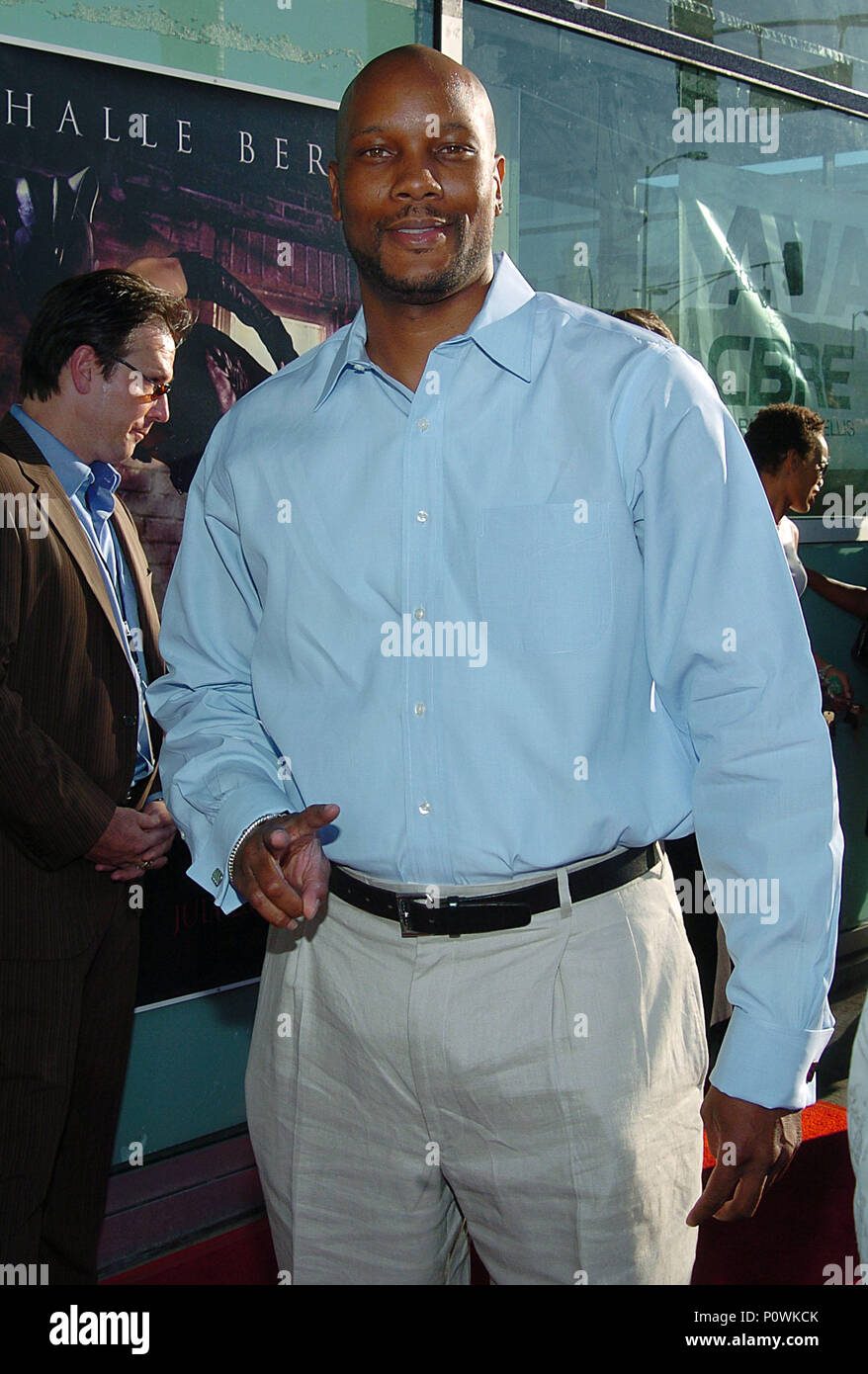 Dwayne Adway arriving at the Catwoman Premiere at the Cinerama Dome ...