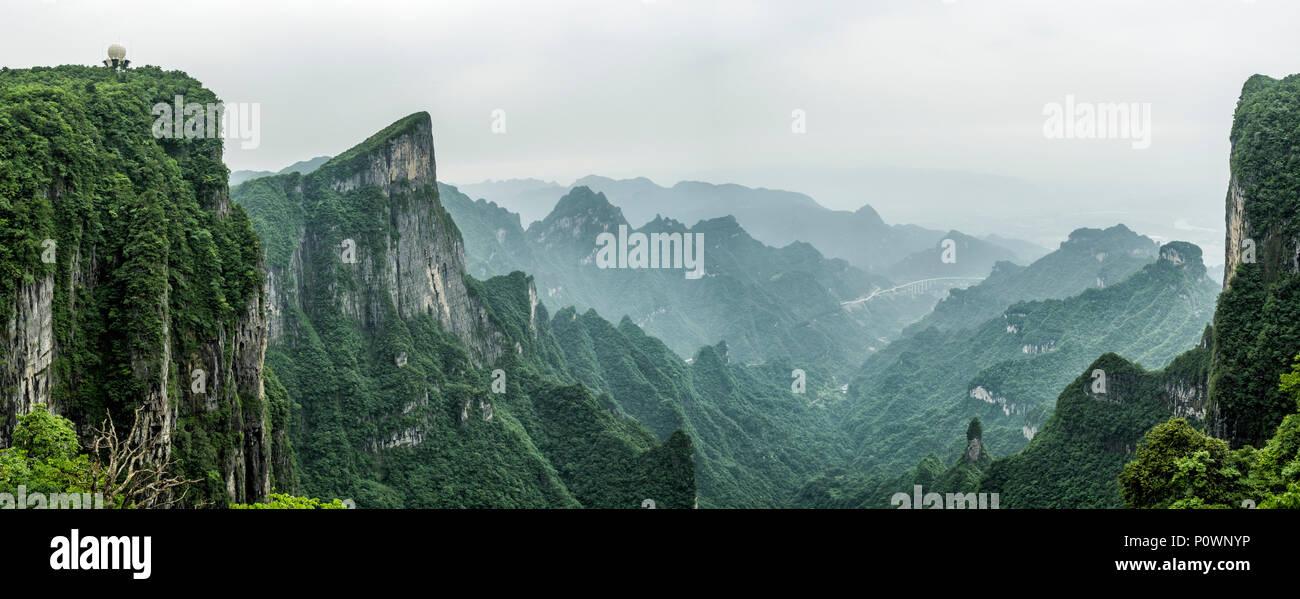 Tianmen Mountain Known as The Heaven's Gate surrounded by the green ...