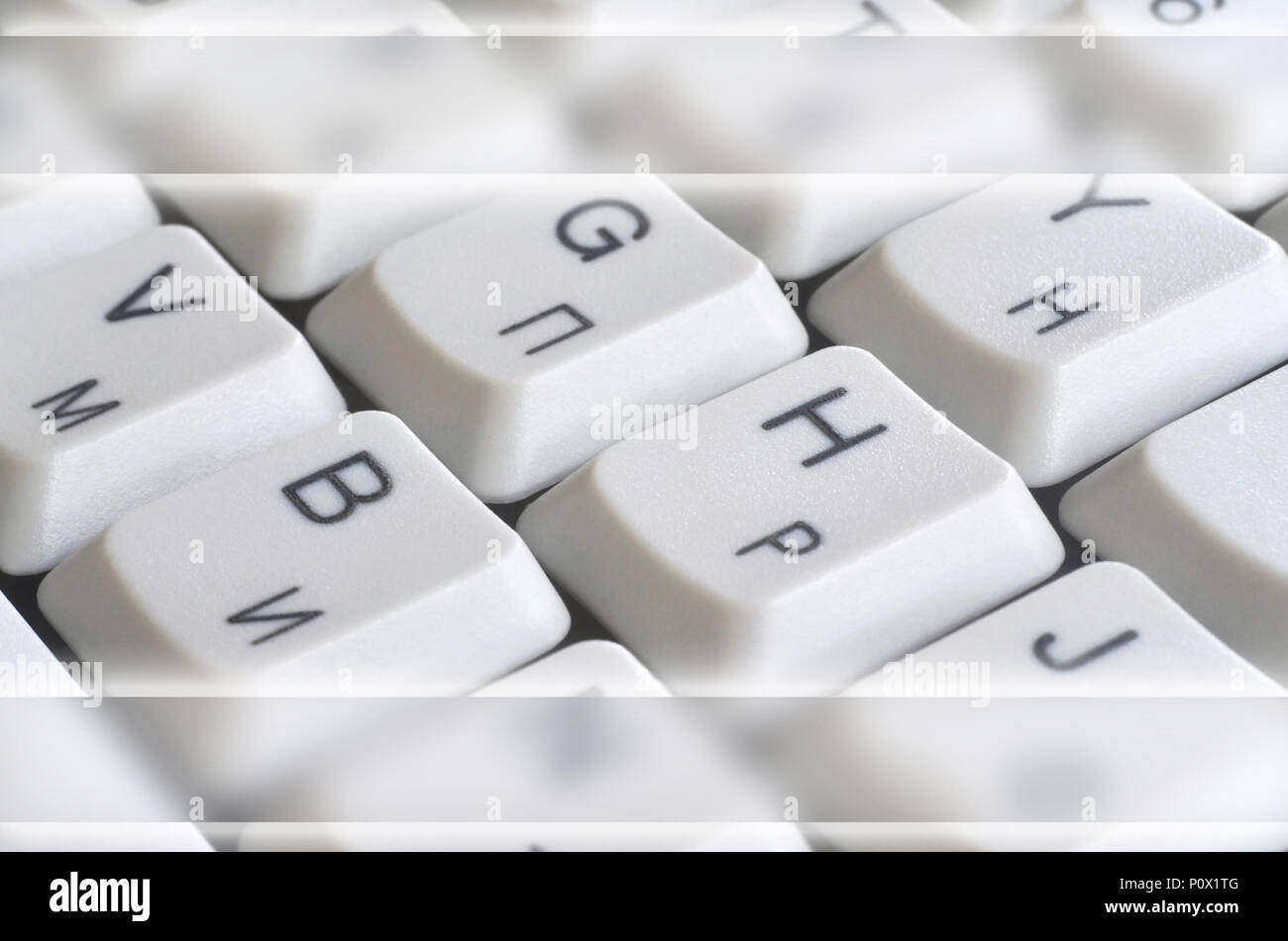 Close-up of the white computer classic keyboard with english and ...