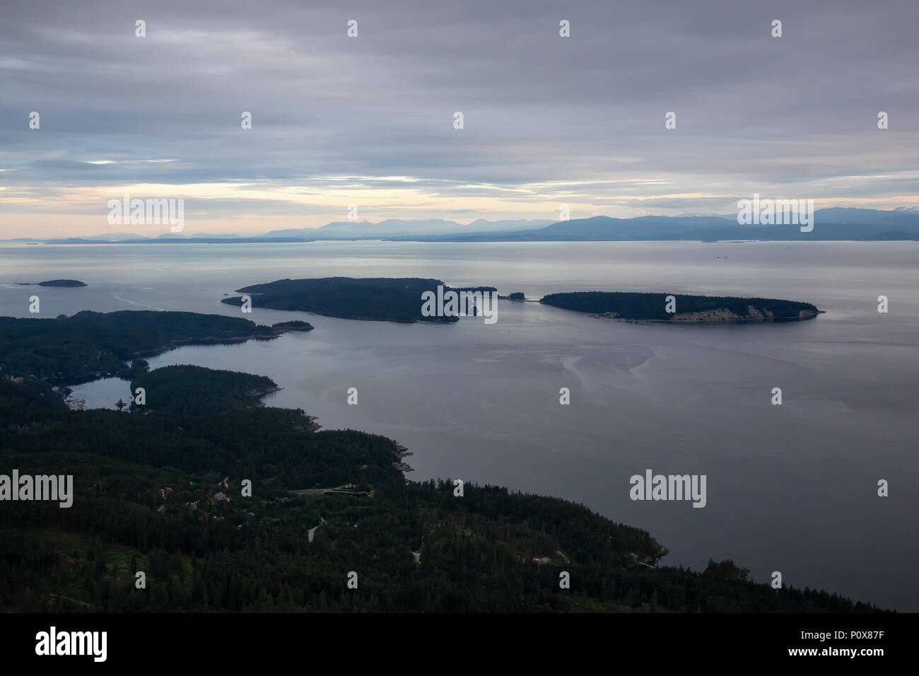 Aerial view of Sunshine Coast during a vibrant cloudy sunset. Located ...
