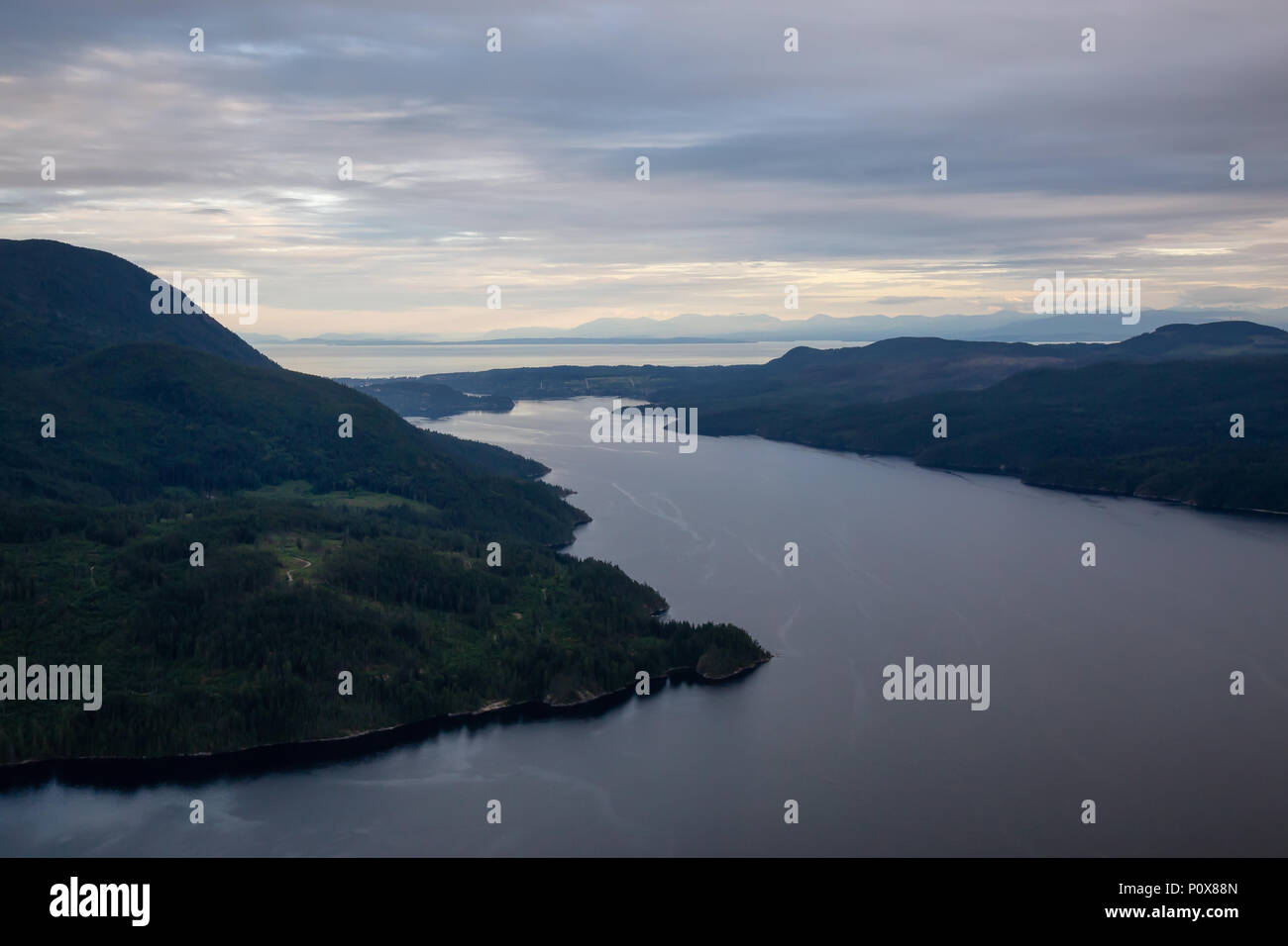 Aerial view of Sechelt Inlet during a vibrant cloudy sunset. Taken in ...
